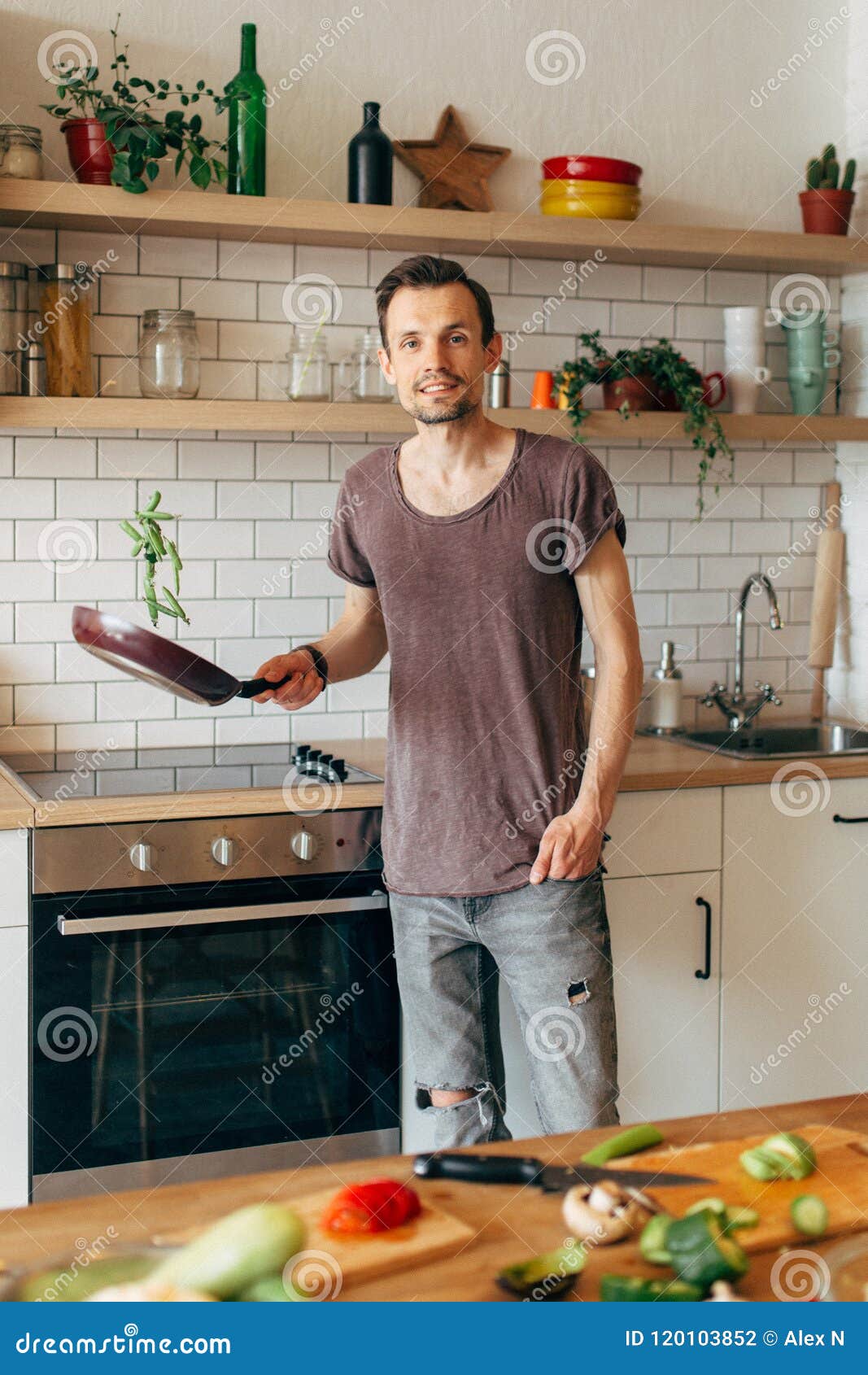 Image of Man with Frying Pan in Hands in Kitchen Stock Photo - Image of ...