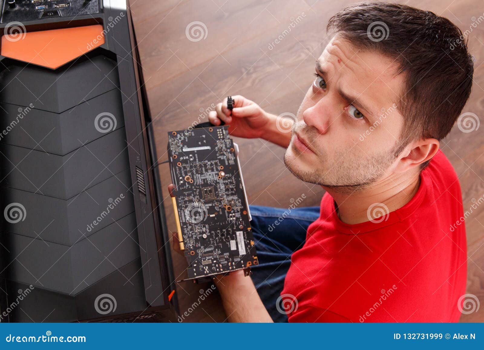 Image of Man Looking at Camera Mending Processor Stock Image - Image of ...