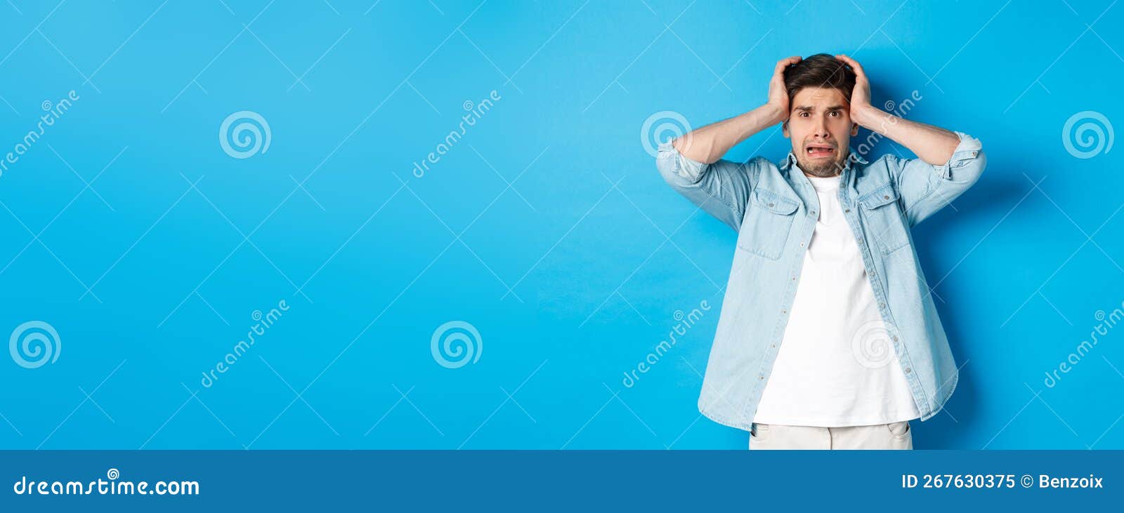 Image of Man in Panic Holding Hands on Head, Looking Frustrated and ...