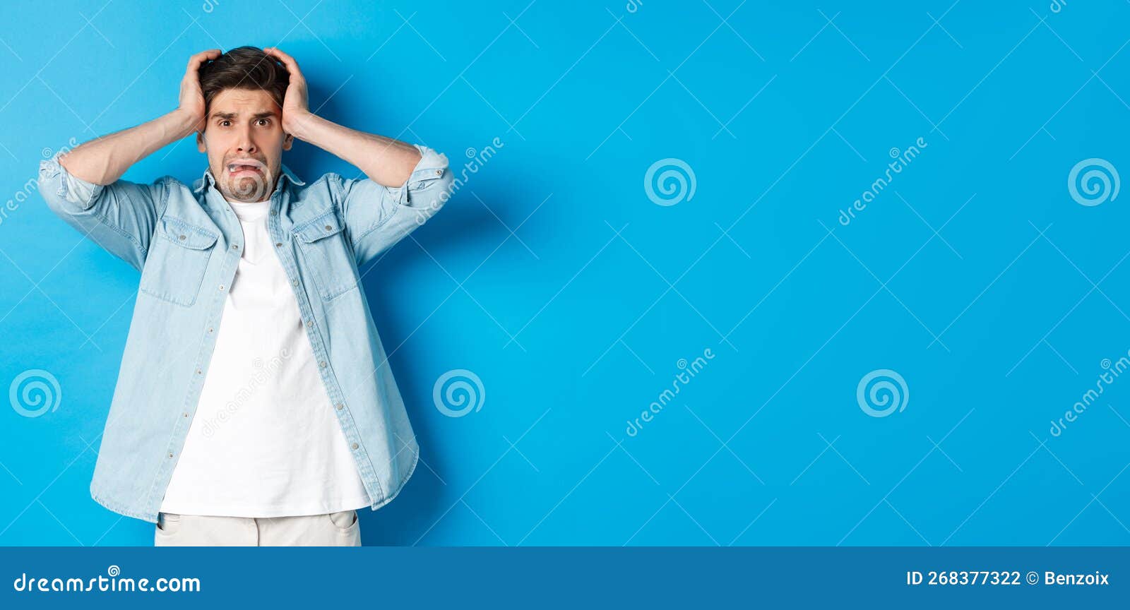 Image of Man in Panic Holding Hands on Head, Looking Frustrated and ...