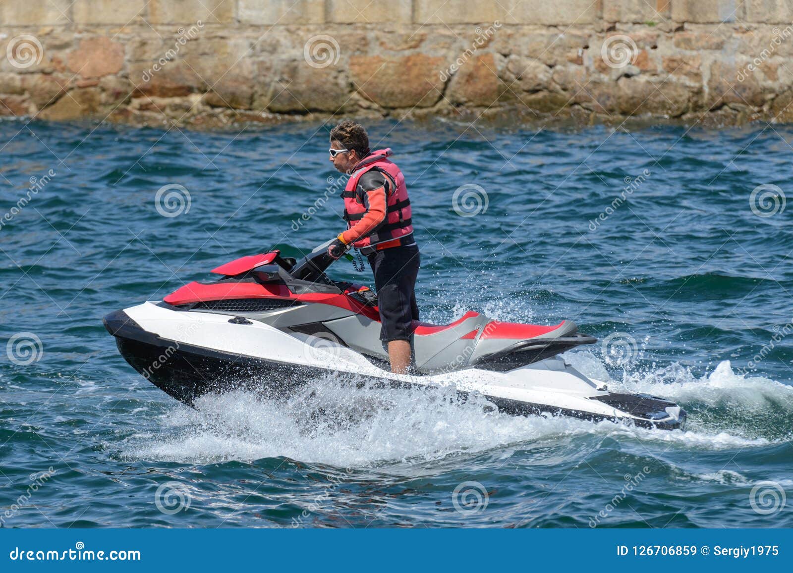 Man is riding a hydrocycle stock image. Image of ride - 126706859
