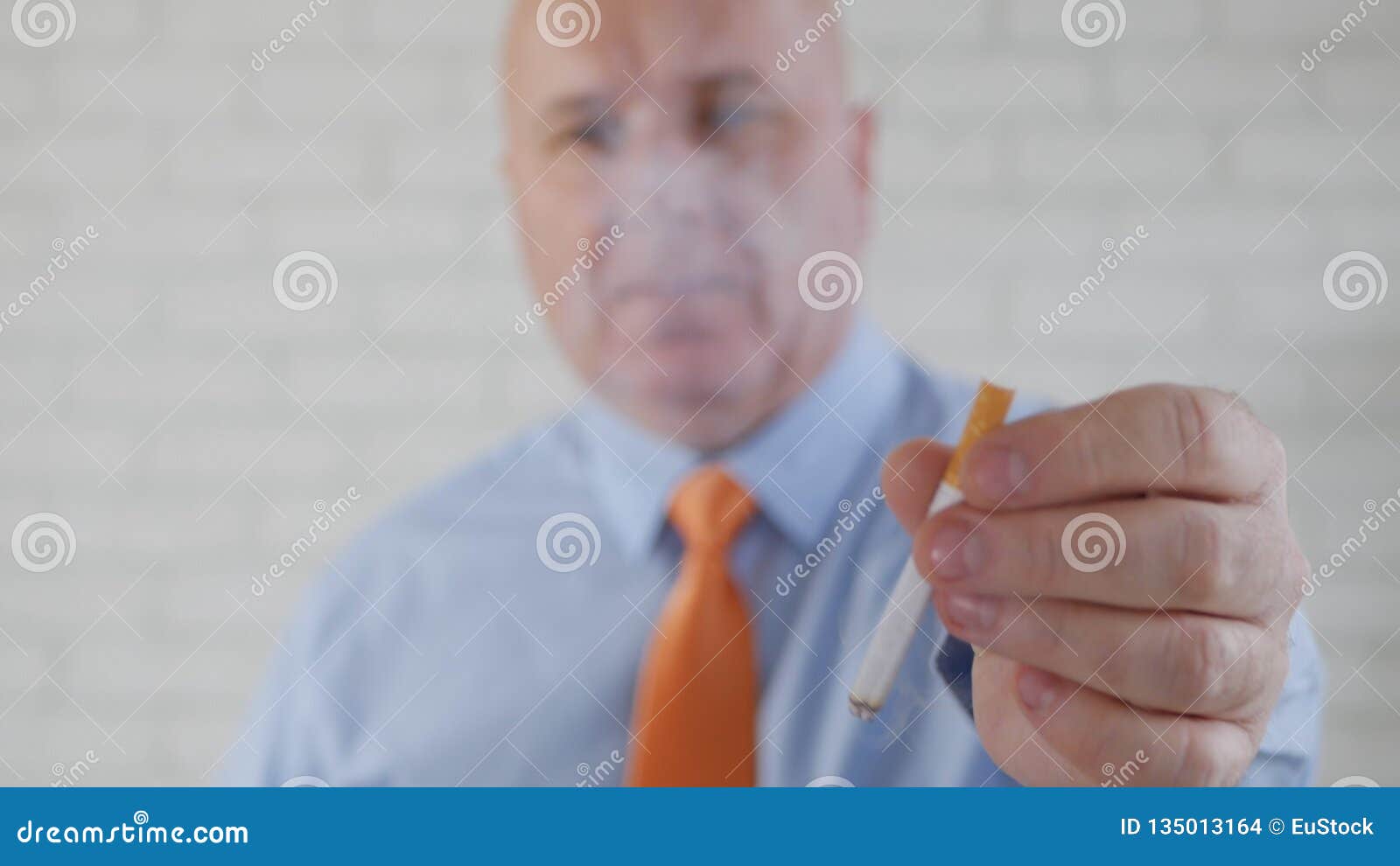 Image with a Man Smoking Making a Lot of Smoke Offering a Lighted ...