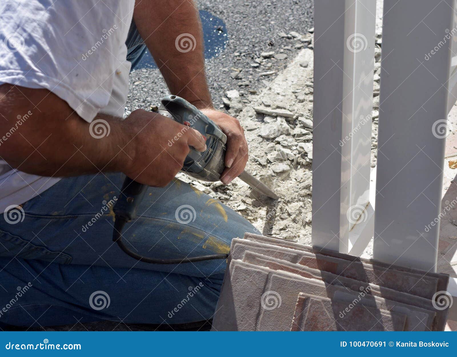Image of Man Worker Holding Ceramic Tile Drill Machine while Drilling ...