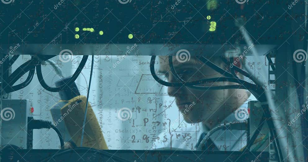 Image of Mathematical Formulas Over Male Engineer Working in Tech Room ...