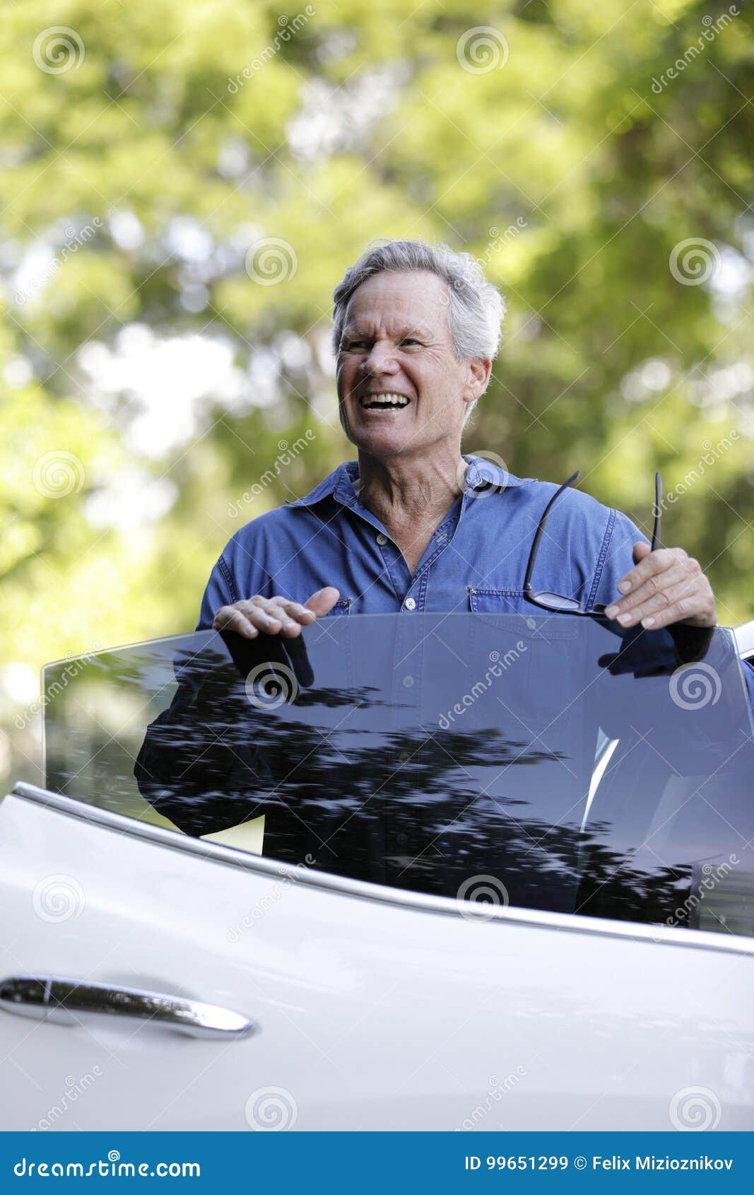 Man getting out of a car stock image. Image of glance - 99651299
