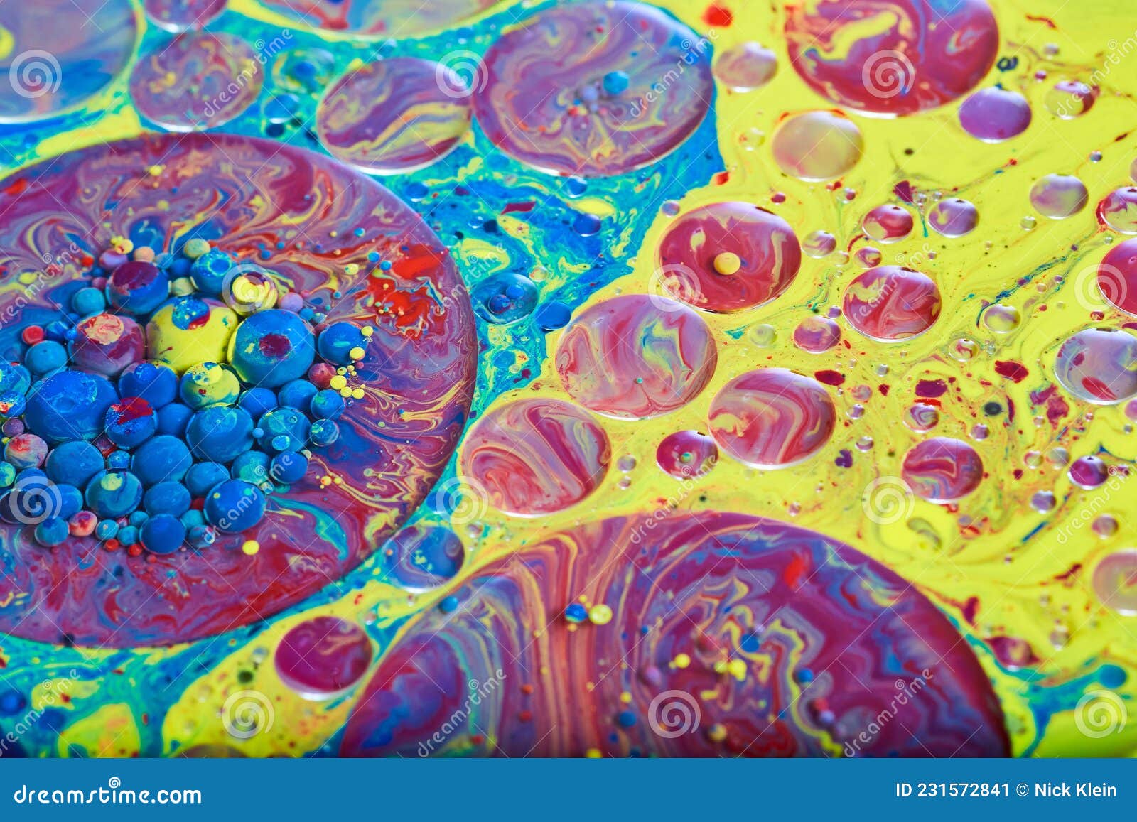 Mesmerizing Surface of Liquid in Rainbow Colors with Circles and ...