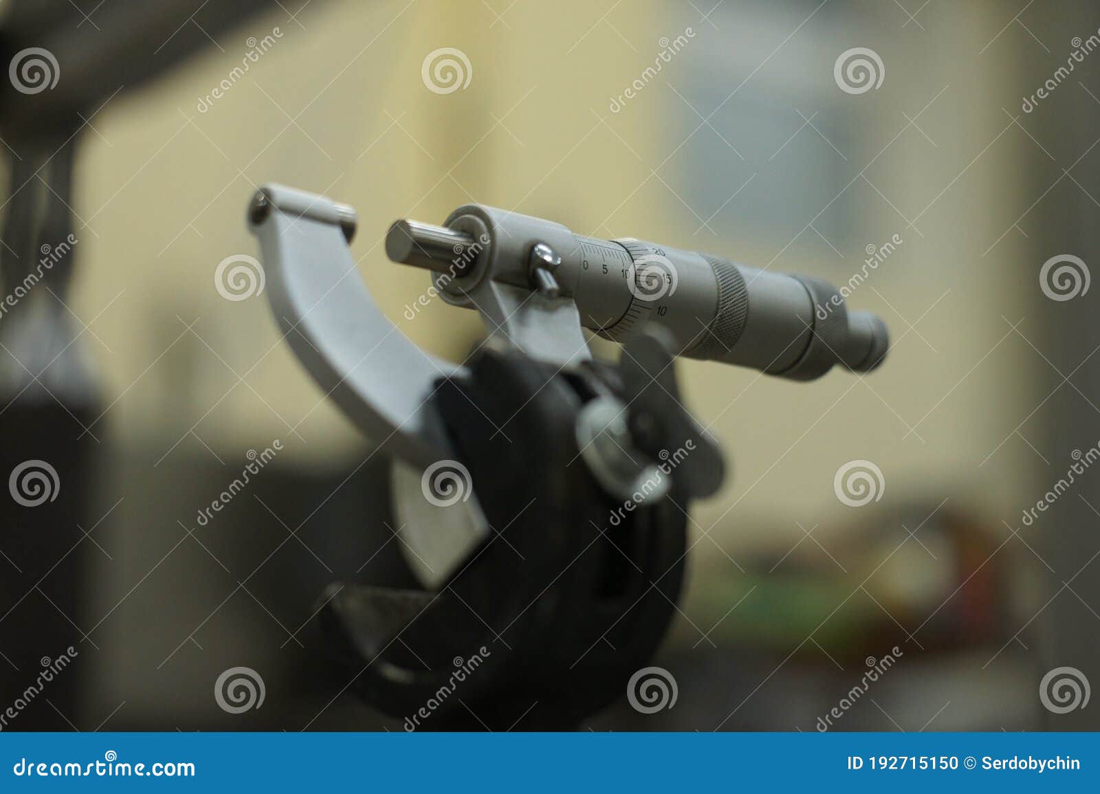 Image of a Metalworking Measuring Tool Mounted in a Rack. Micrometer ...