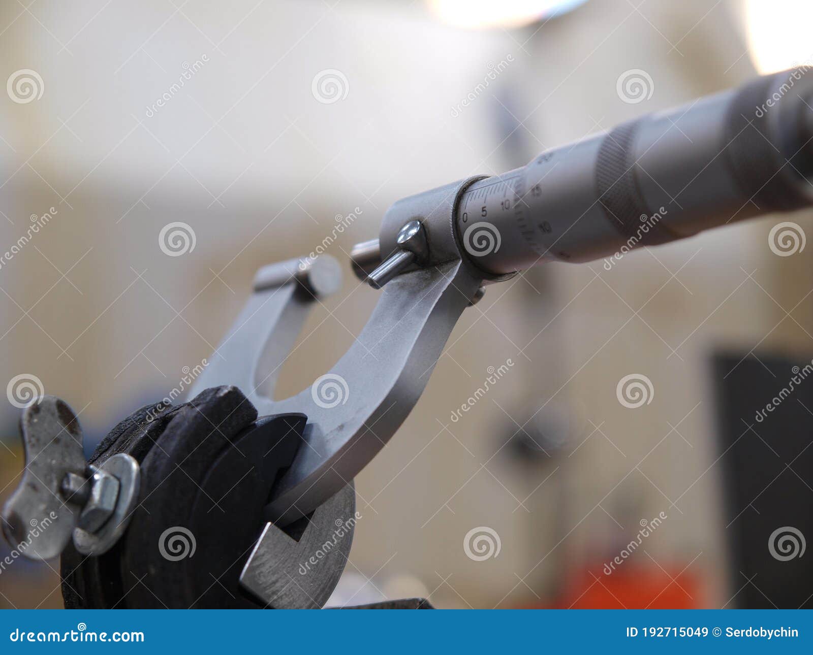 Image of a Metalworking Measuring Tool Mounted in a Rack. Micrometer ...