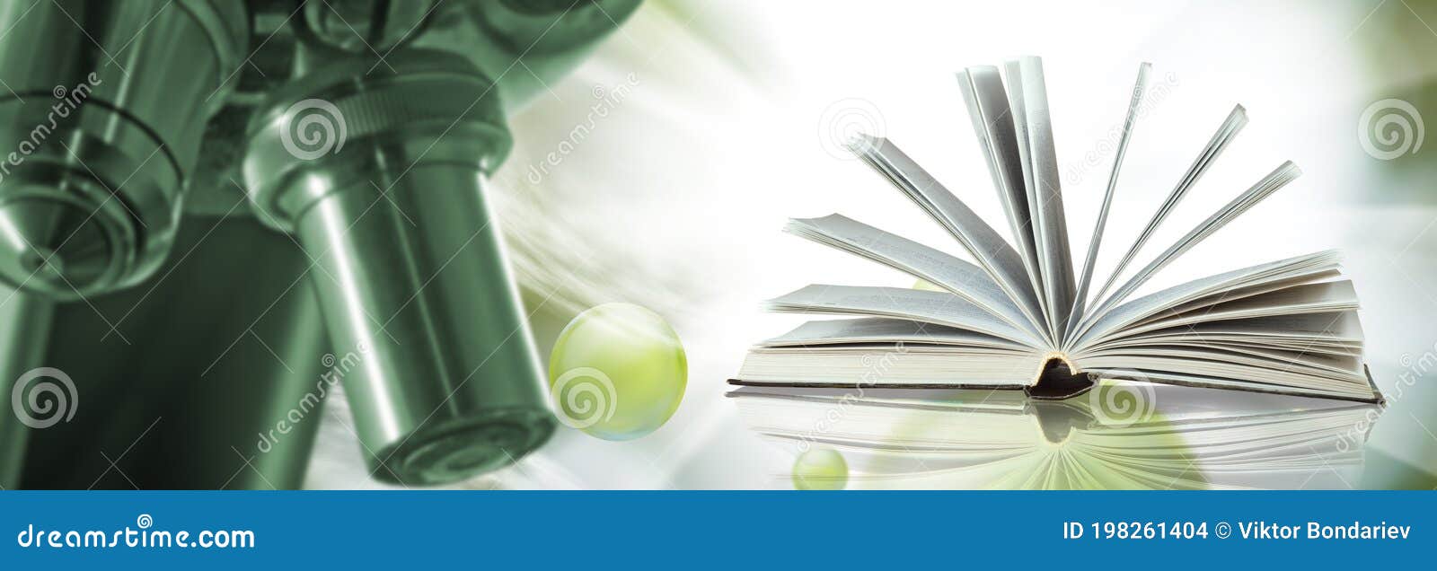 Image of Microscope, Open Book on Blurred Green Background Stock Photo ...