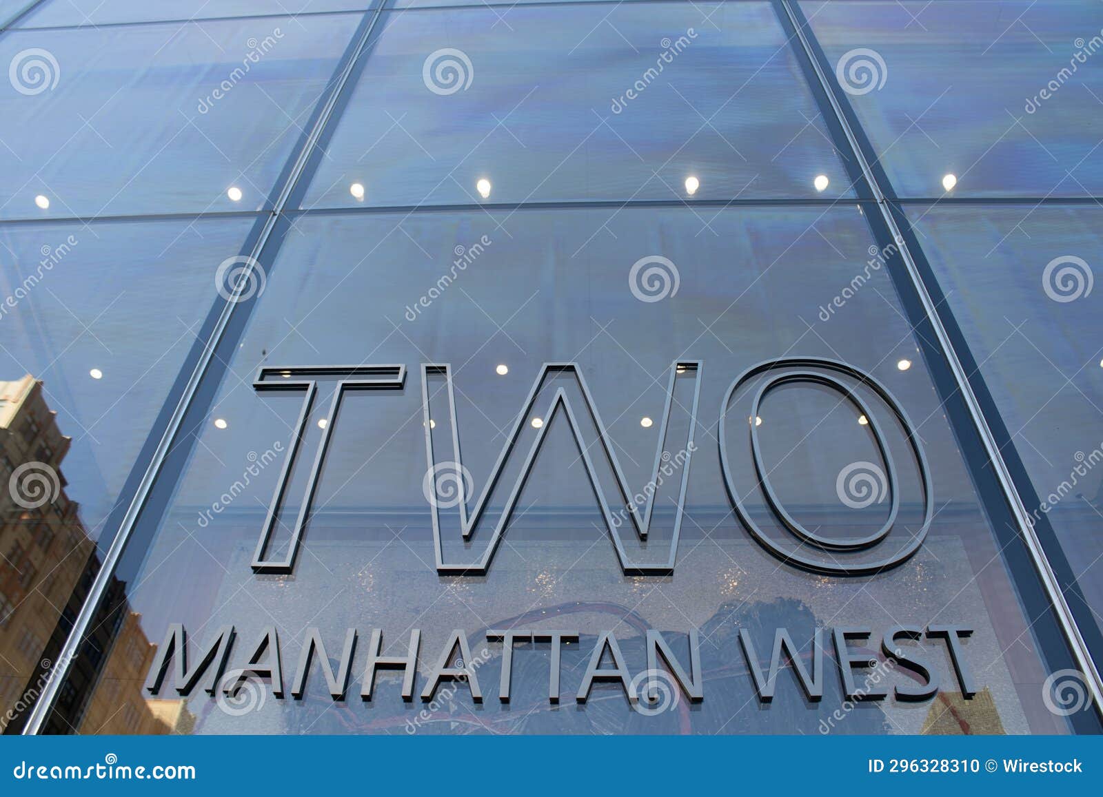 Two Midtown West Sign Outside a Building in Front of the Window ...
