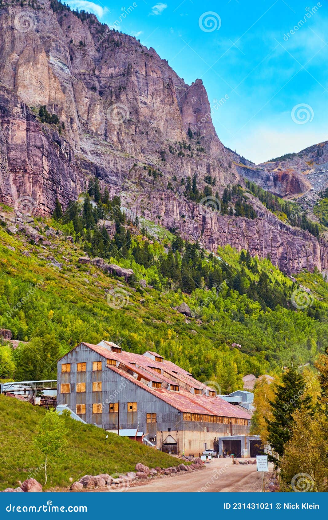 Mining Structure at End of Road with Large Vertical Mountains in ...