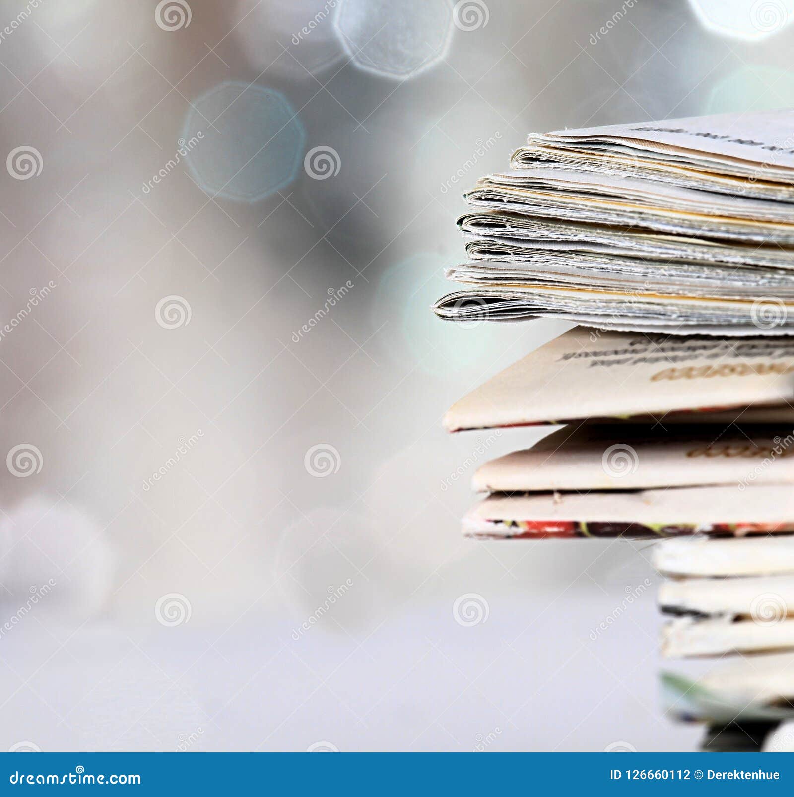 Newspaper Piled Up on a Table Stock Photo - Image of education ...