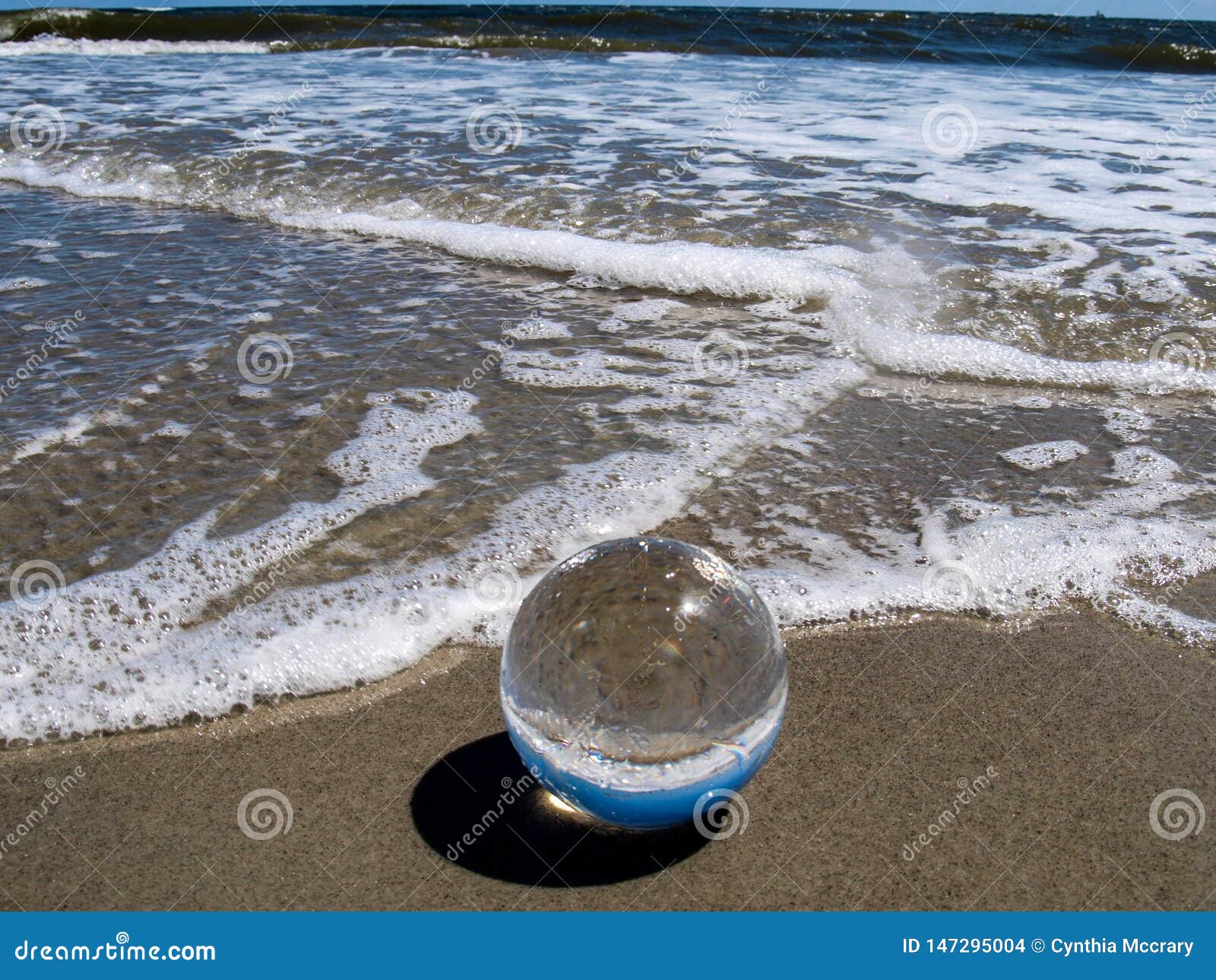 Ocean Image Inverted in Lens Ball Stock Photo - Image of waves, lens ...