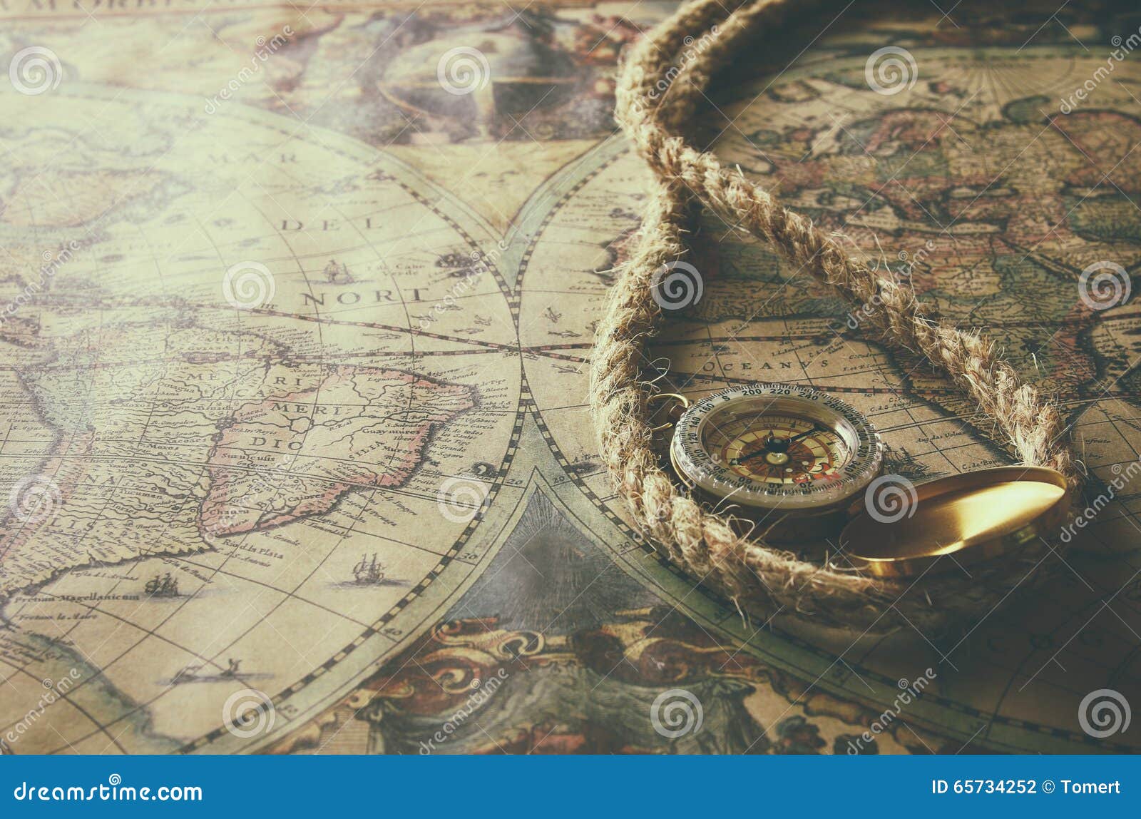 Image of Old Compass and Rope on Vintage Map Stock Photo - Image of ...