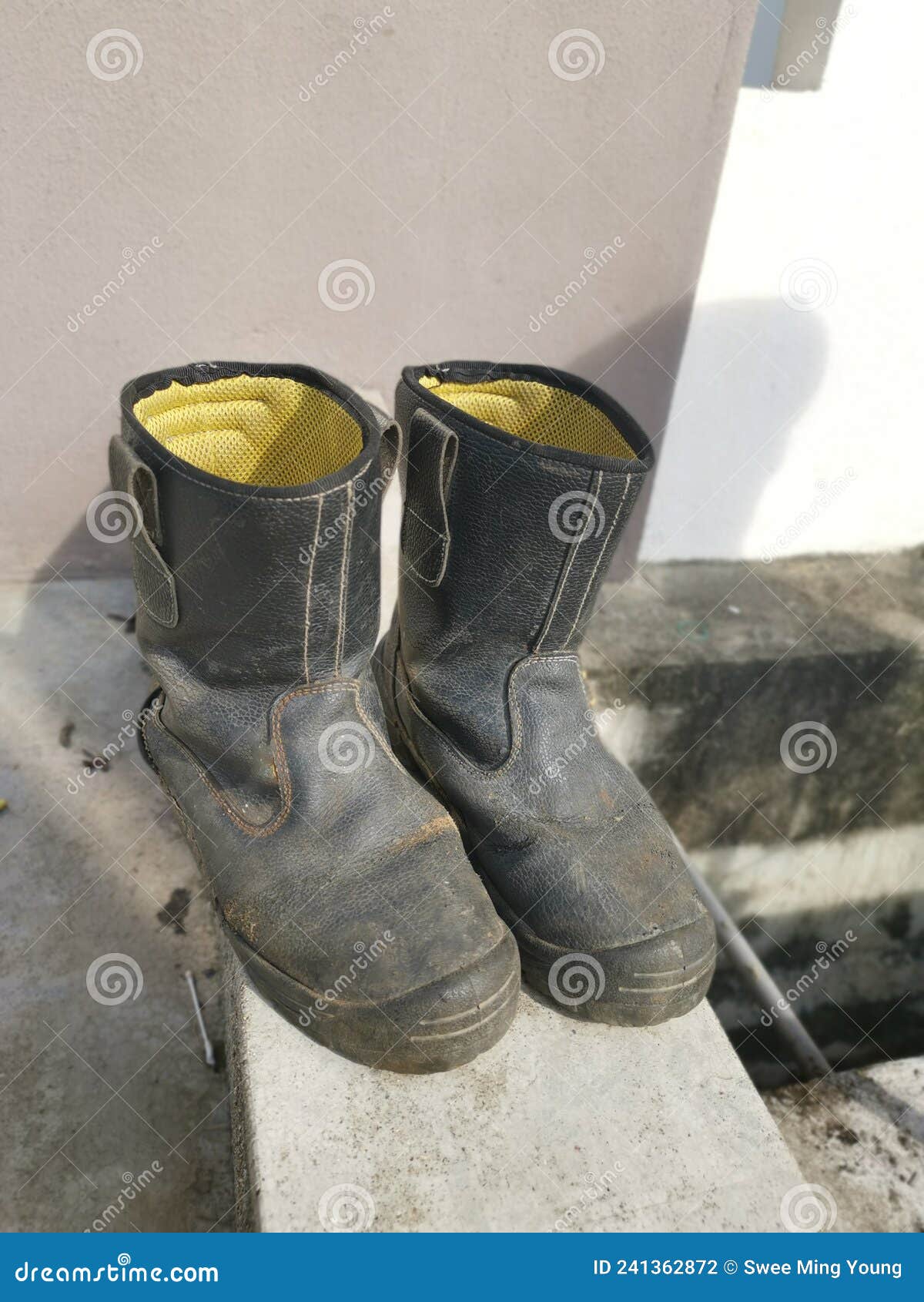 Old Leather Boot Drying on the Concrete Lap. Stock Photo - Image of ...
