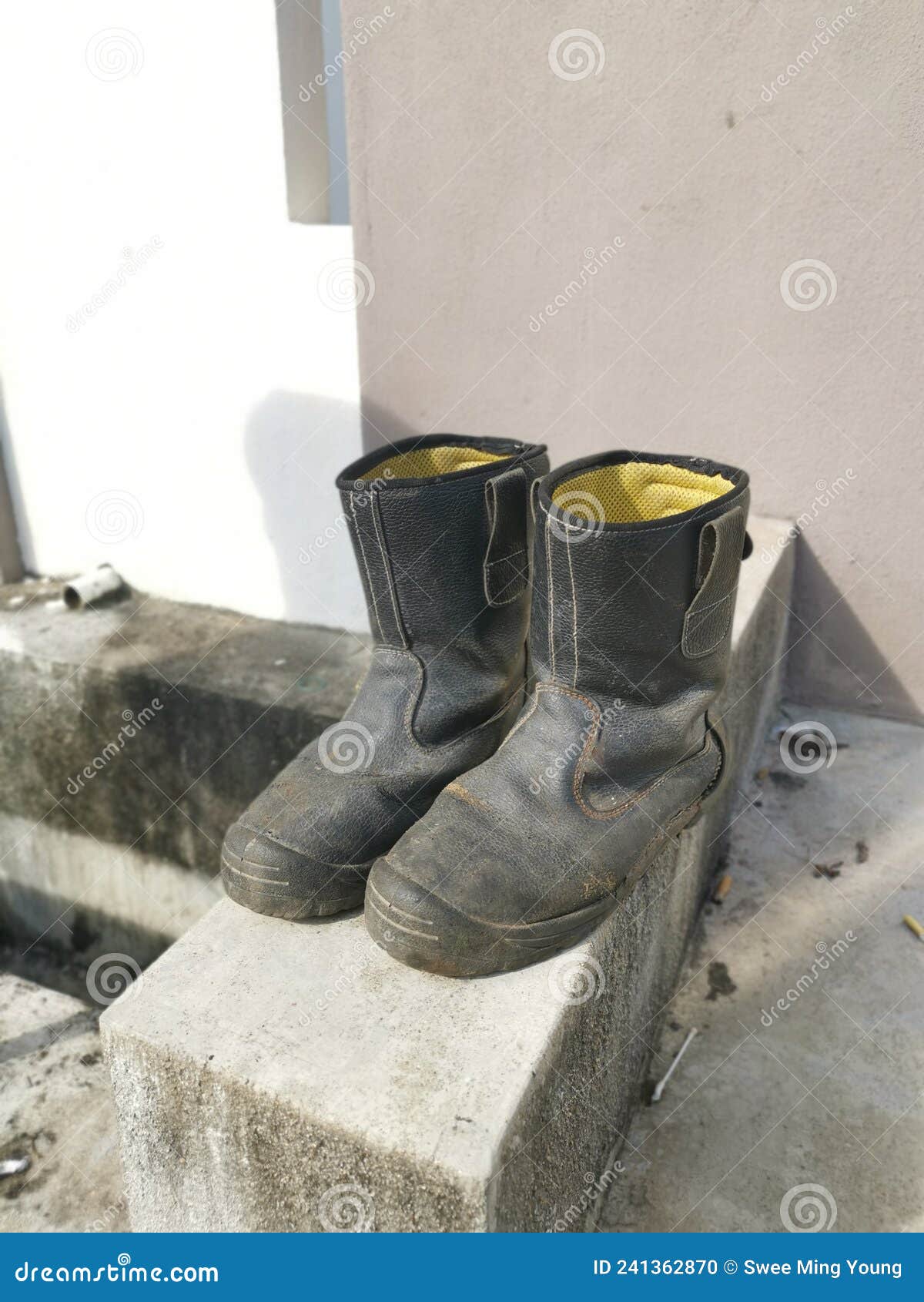 Old Leather Boot Drying on the Concrete Lap. Stock Photo - Image of ...