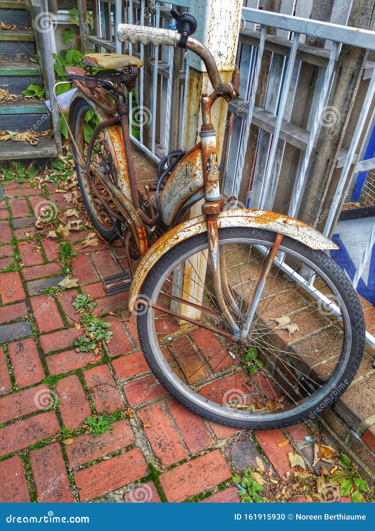 Old Rusty Bicycle Sitting on Brick Walkway Stock Photo - Image of bike ...