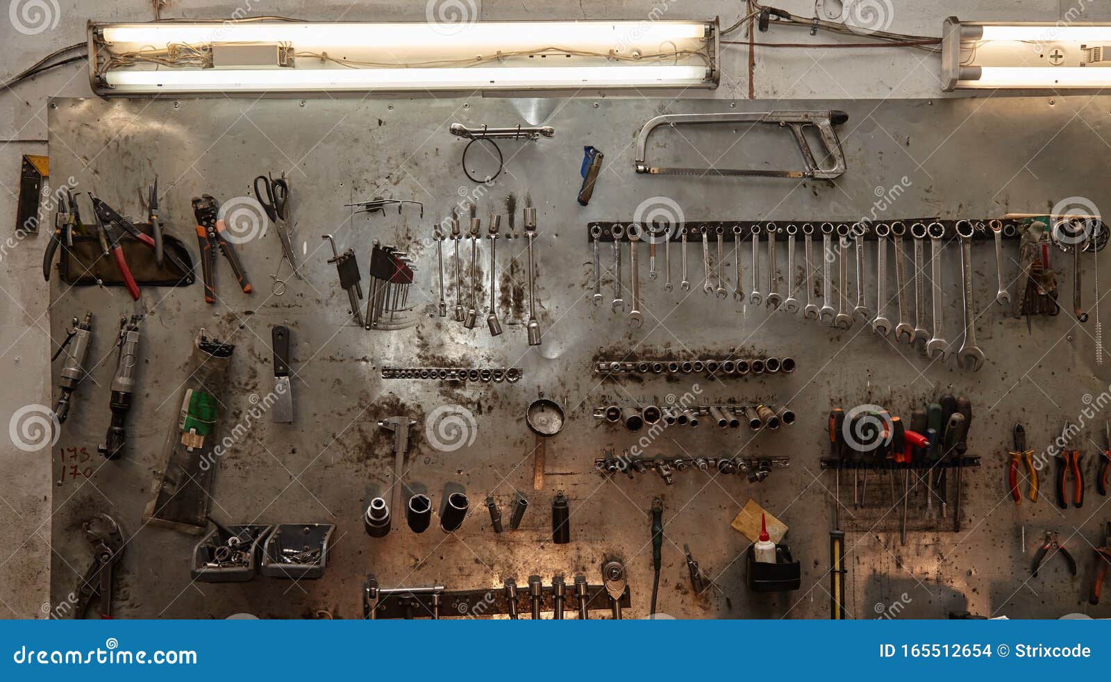 Image of Old Tools Hanging on Wall in Workshop. Vintage Retro Garage ...