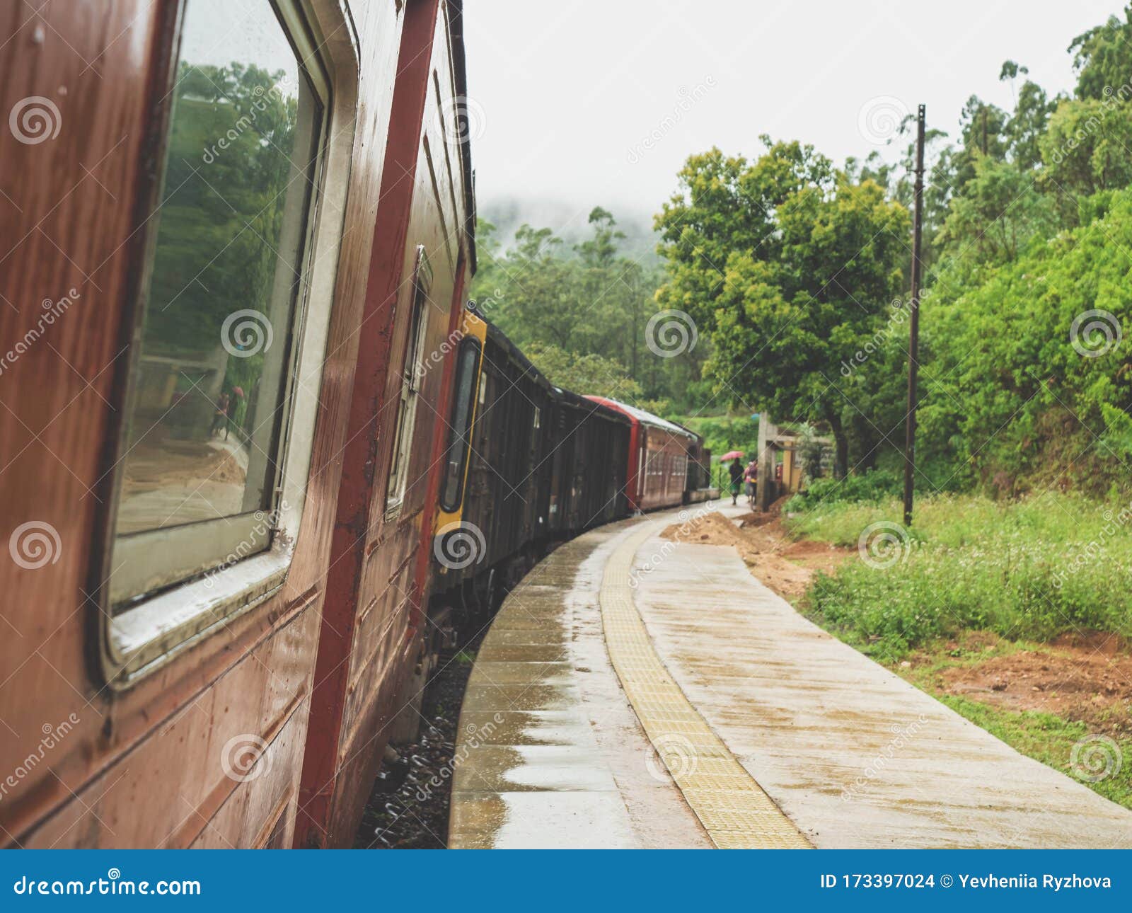 Image of Old Train Driving on Railroad in Rain Stock Photo - Image of ...
