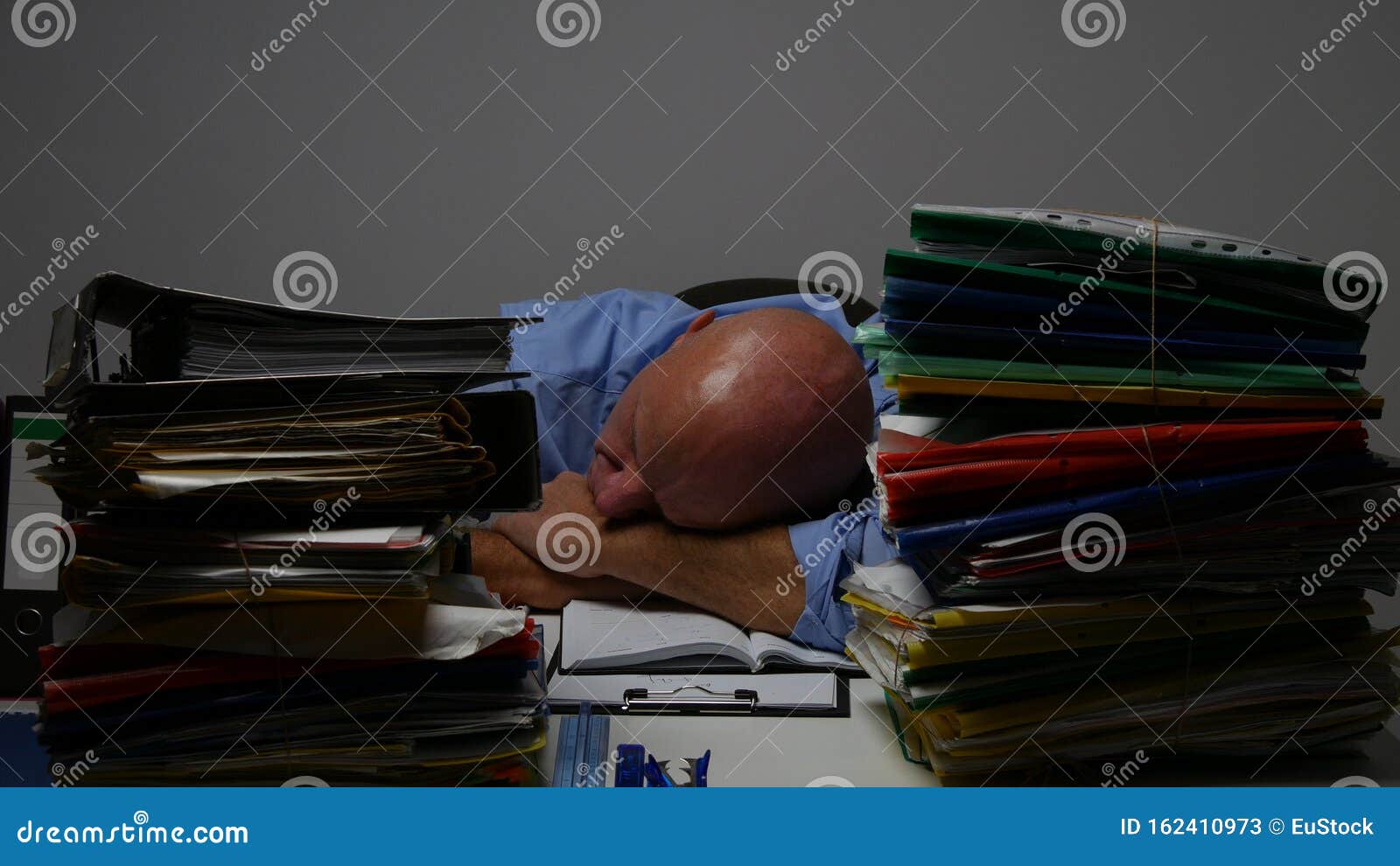 Image with Overworked Employee Sleeping on the Desk in the Office Stock ...