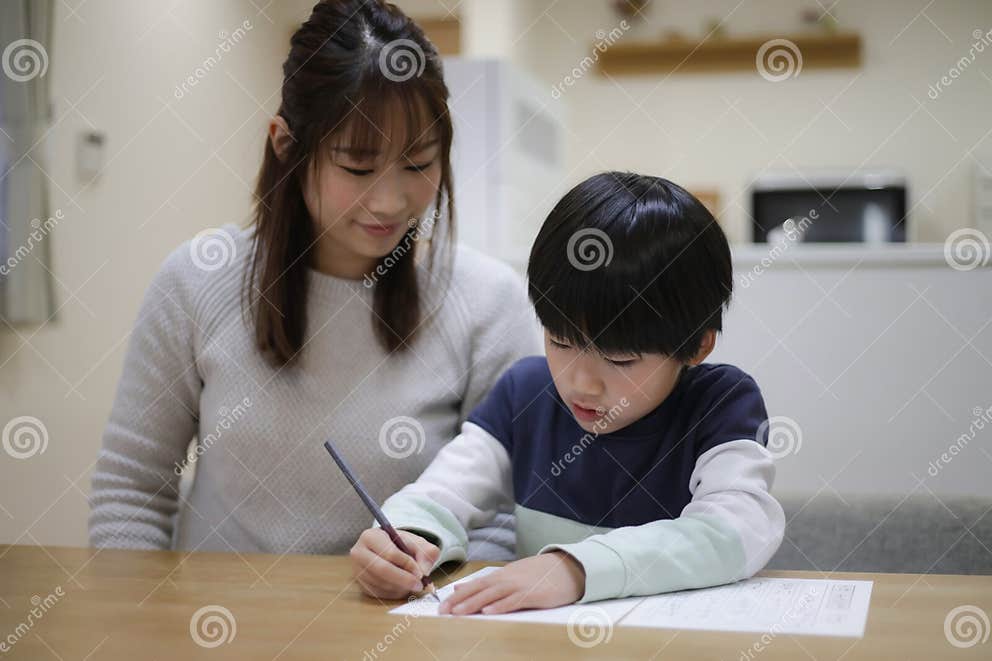 Parents and Children Practicing Hard Penmanship Stock Photo - Image of ...