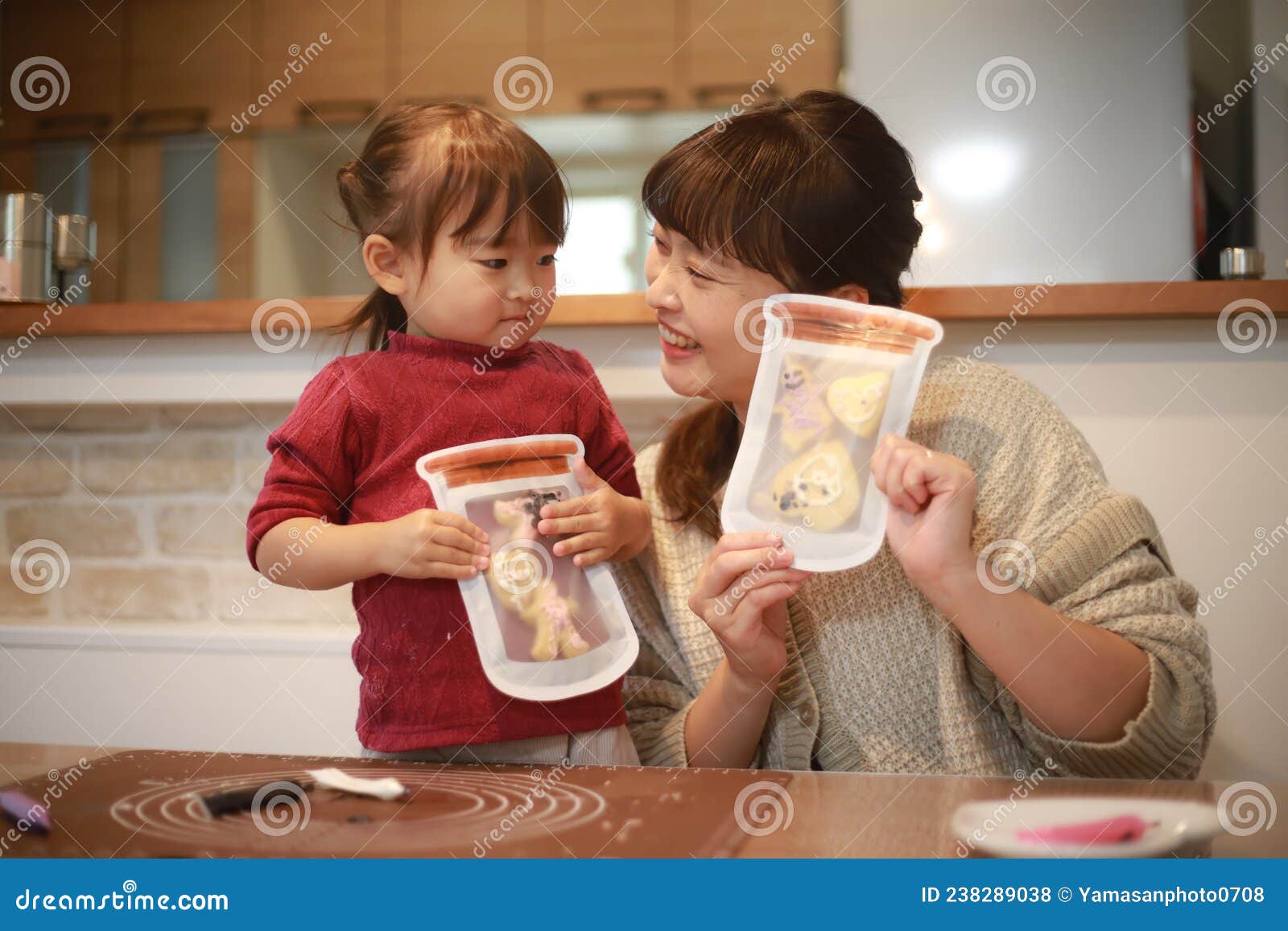 Parents and Children Making Sweets Stock Photo - Image of childcare ...