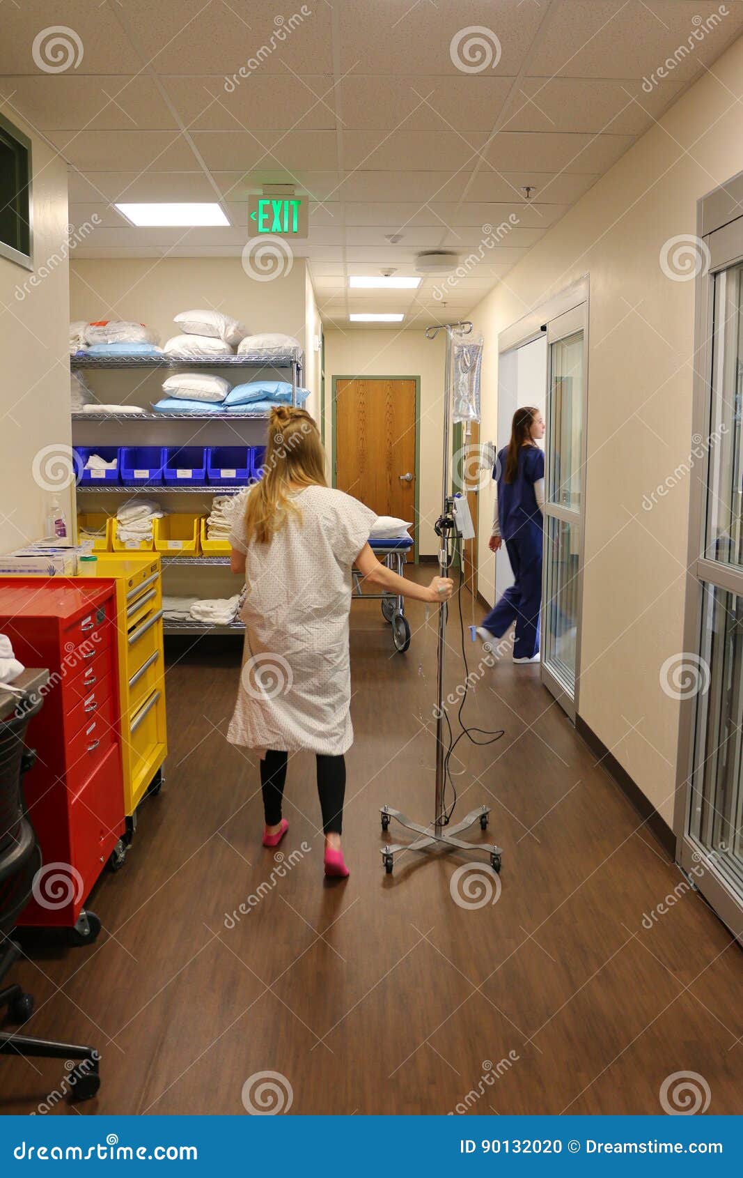 Image of Patient Walking in Hospital Hallway Stock Photo - Image of ...