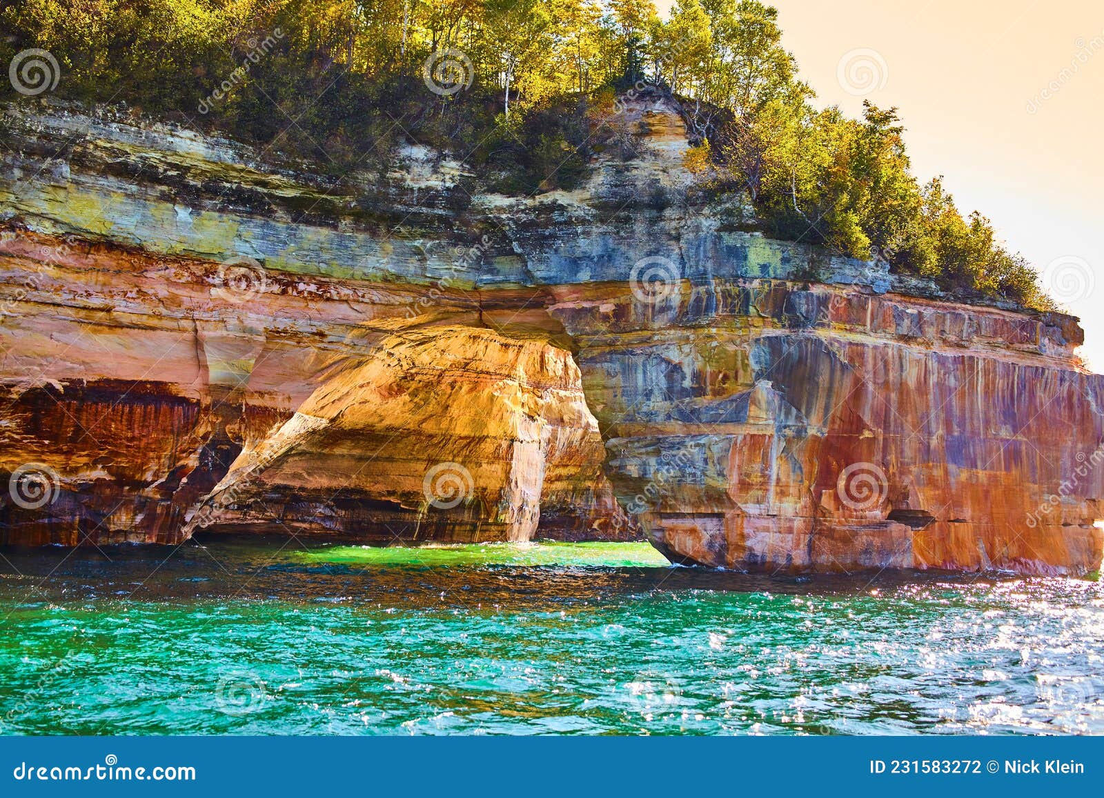 Pictured Rocks with Tunnel through the Cliff Stock Photo - Image of ...