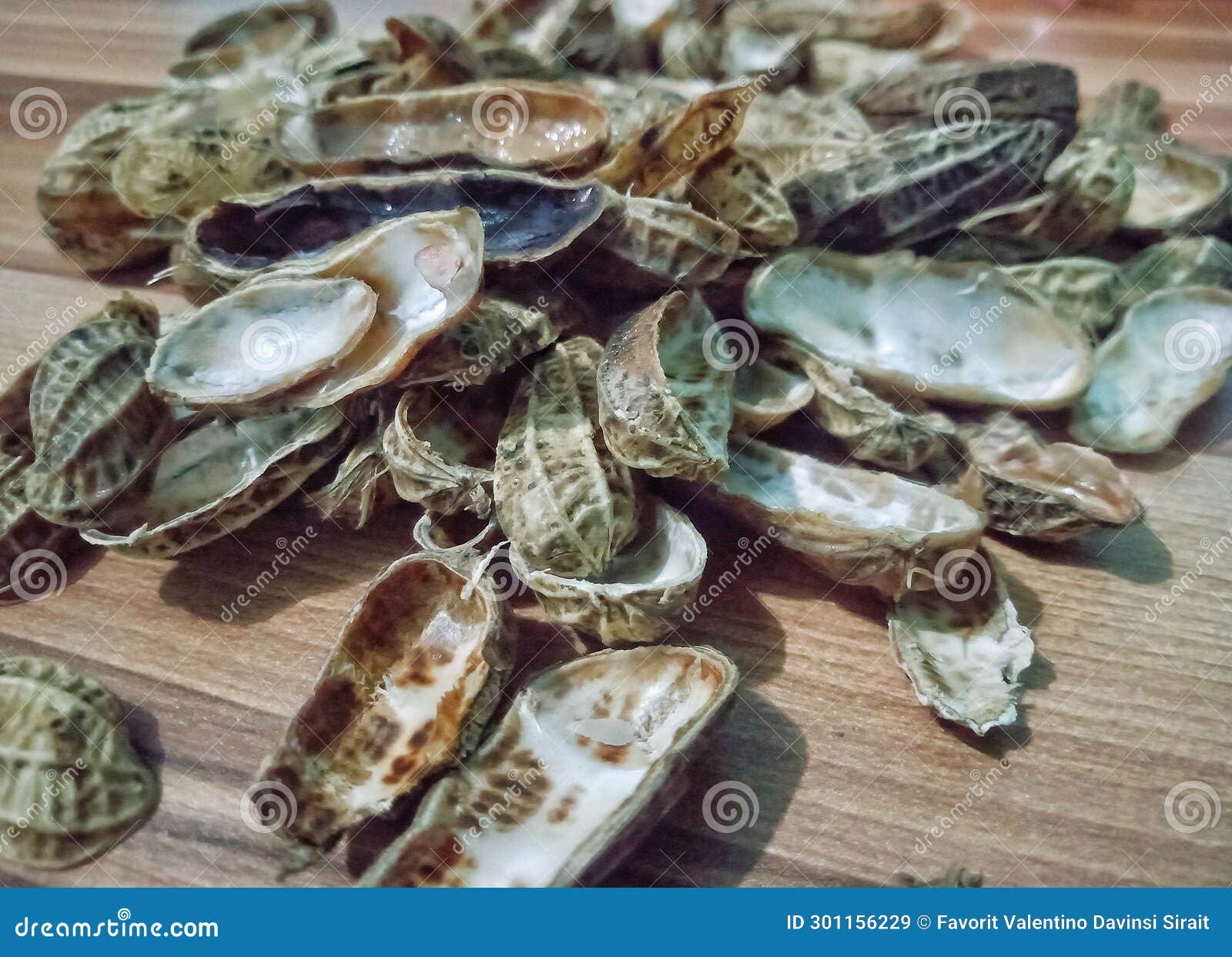Image of a Pile of Empty Peanut Shells Lay Scattered on the Table Stock ...