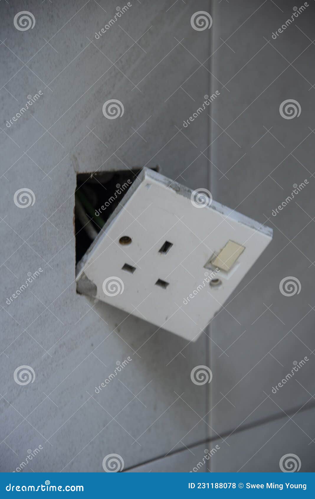 3-pin Plug Socket Adapter Hanging Out from the Wall Stock Photo - Image ...