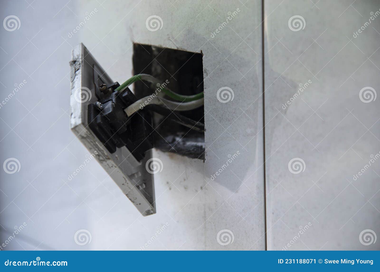 3-pin Plug Socket Adapter Hanging Out from the Wall Stock Image - Image ...