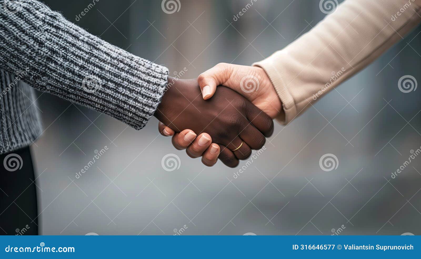 An Image Portraying Unity and Support through a Handshake between Two ...
