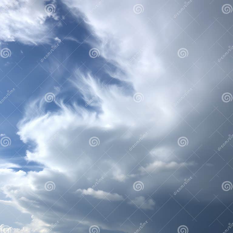 A Cloudy Sky with Dramatic, Fast Moving Clouds Swirling Above Stock ...