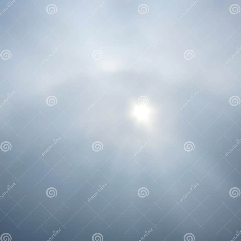 A Misty Sky with Thick Fog and Subtle Rays of Light Piercing through ...