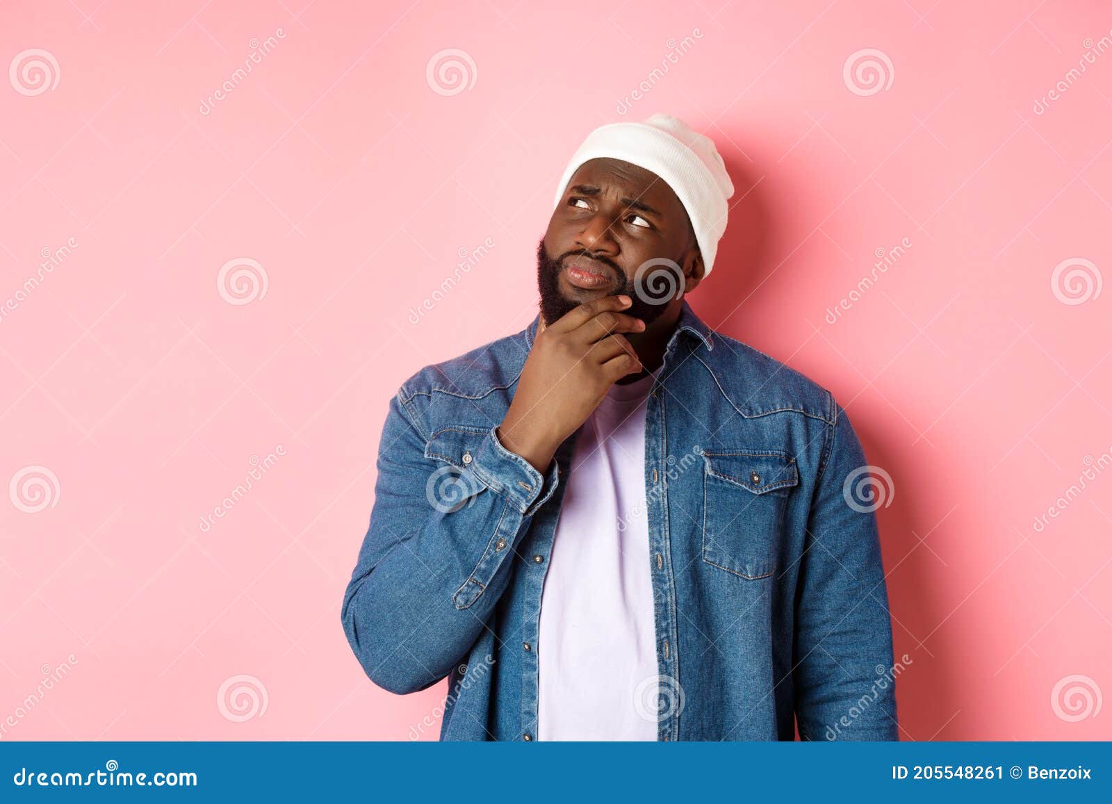 Image of Puzzled and Concerned Black Man, Staring at Upper Left Corner ...