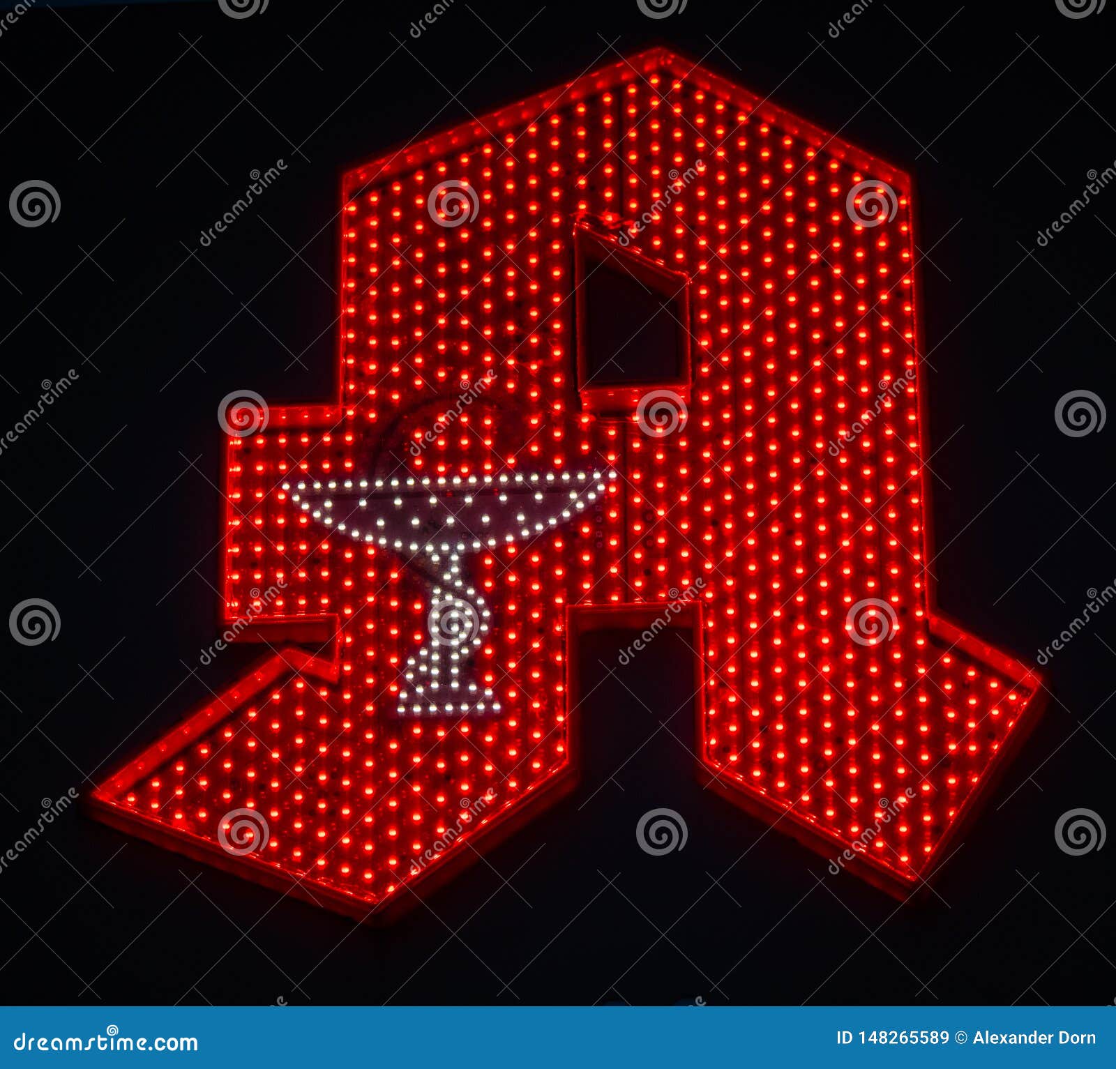Image of Red Illuminated German Pharmacy Sign with Dark Background ...