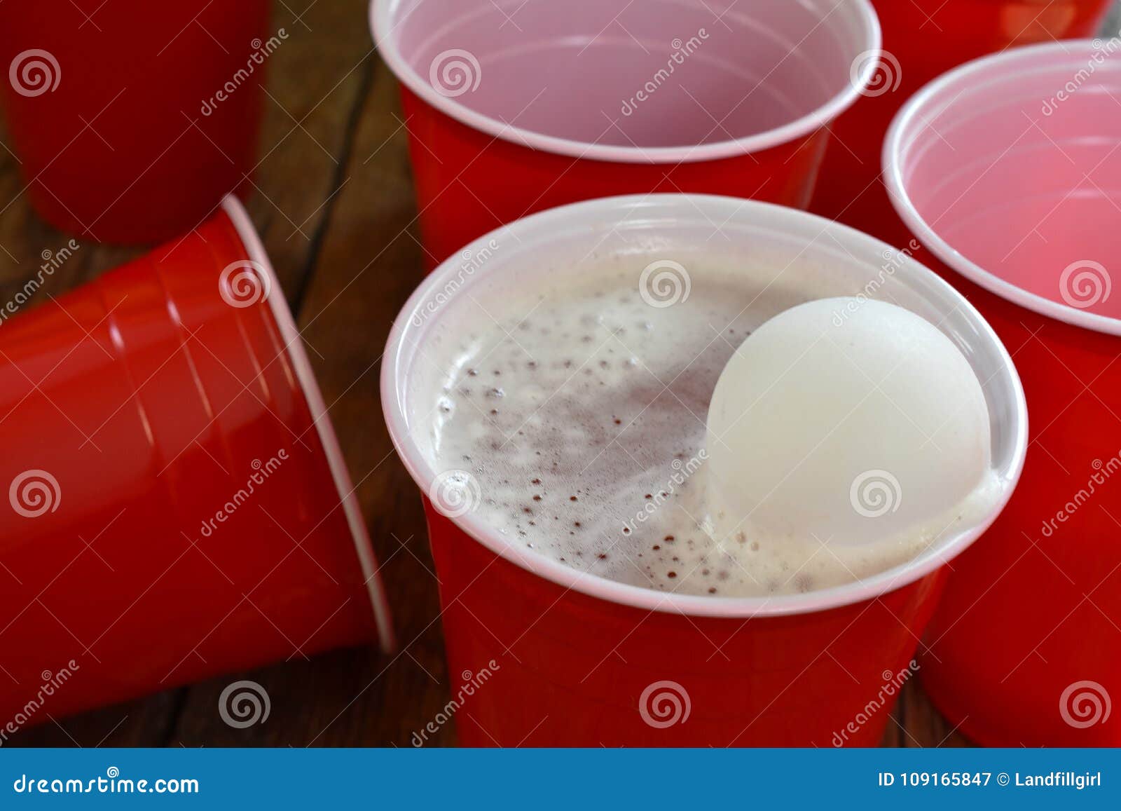 Red Plastic Drinking Cups and Spilled Beer Stock Image - Image of brown ...