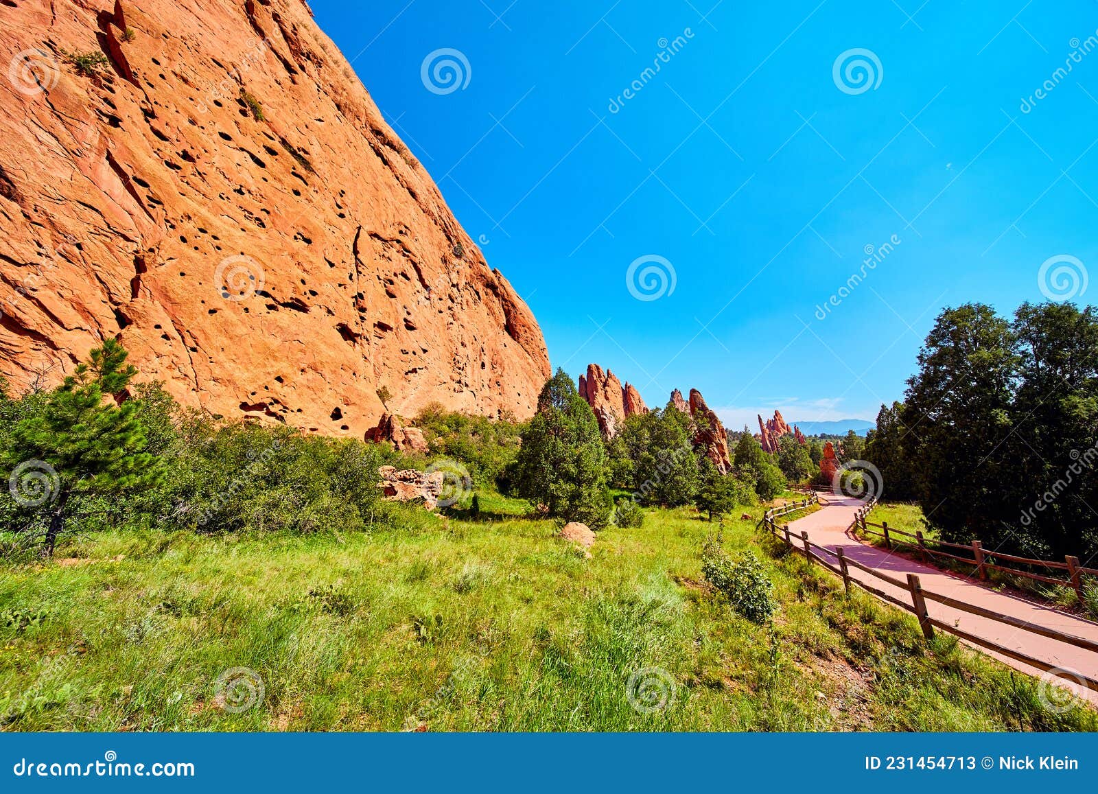 Red Rocks in Desert with Paved Walking Path Stock Image - Image of rock ...