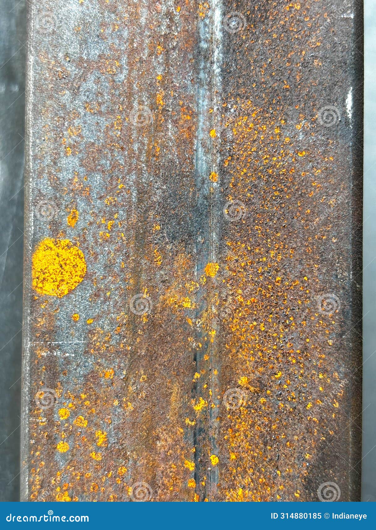 The Image is of a Rusty Metal Object with a Yellow Spot on it Stock ...