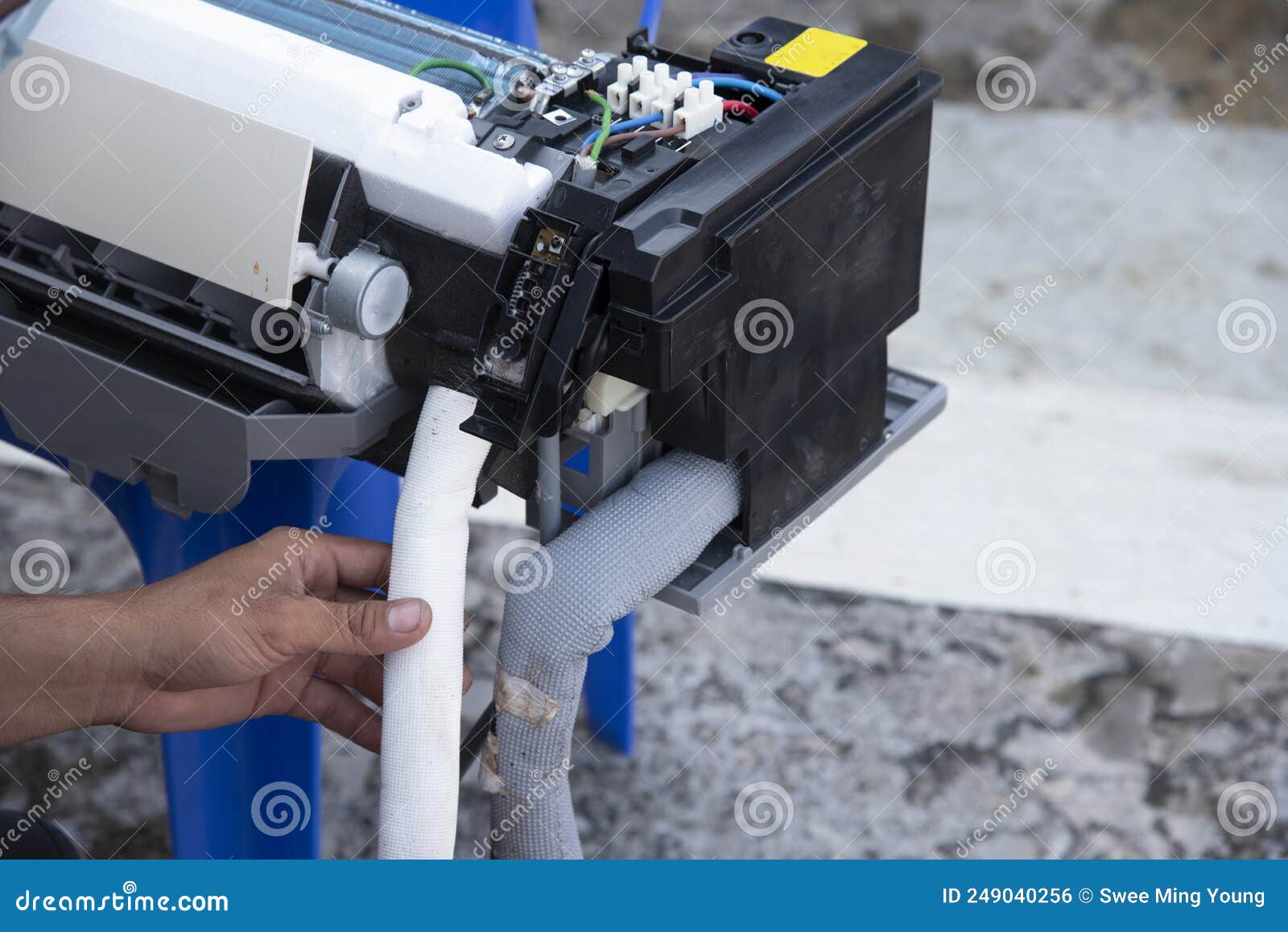 Scene of an Unknown Worker Servicing Disassemble Air-conditioner Parts ...