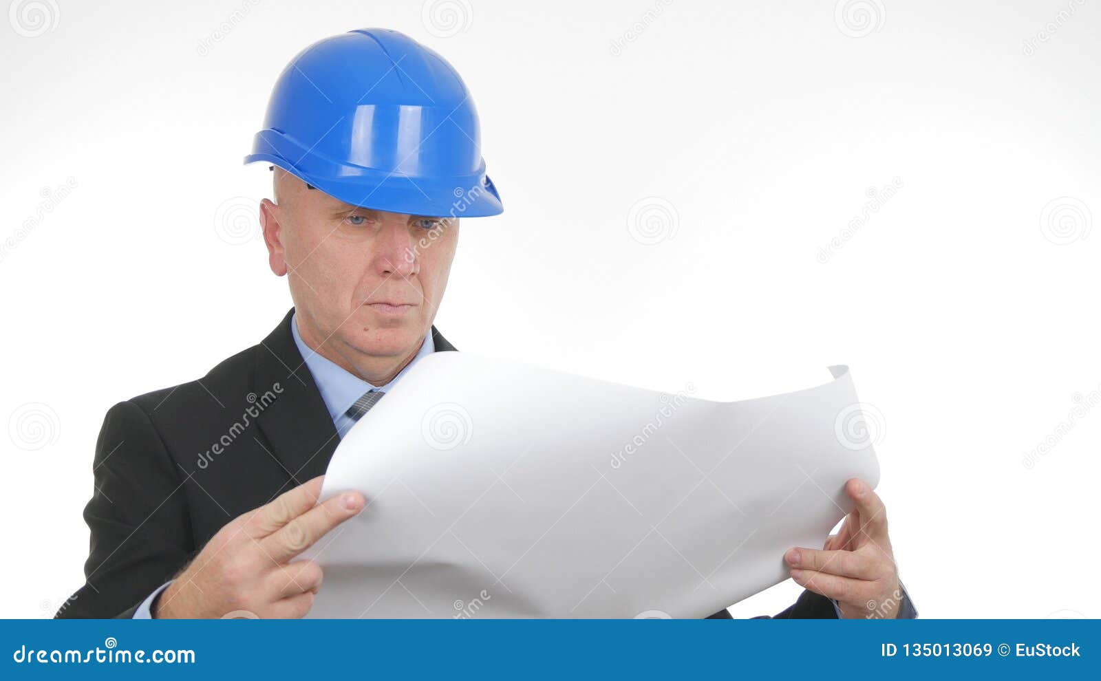 Engineer Image Reading a Construction Paper Plan Stock Image - Image of ...