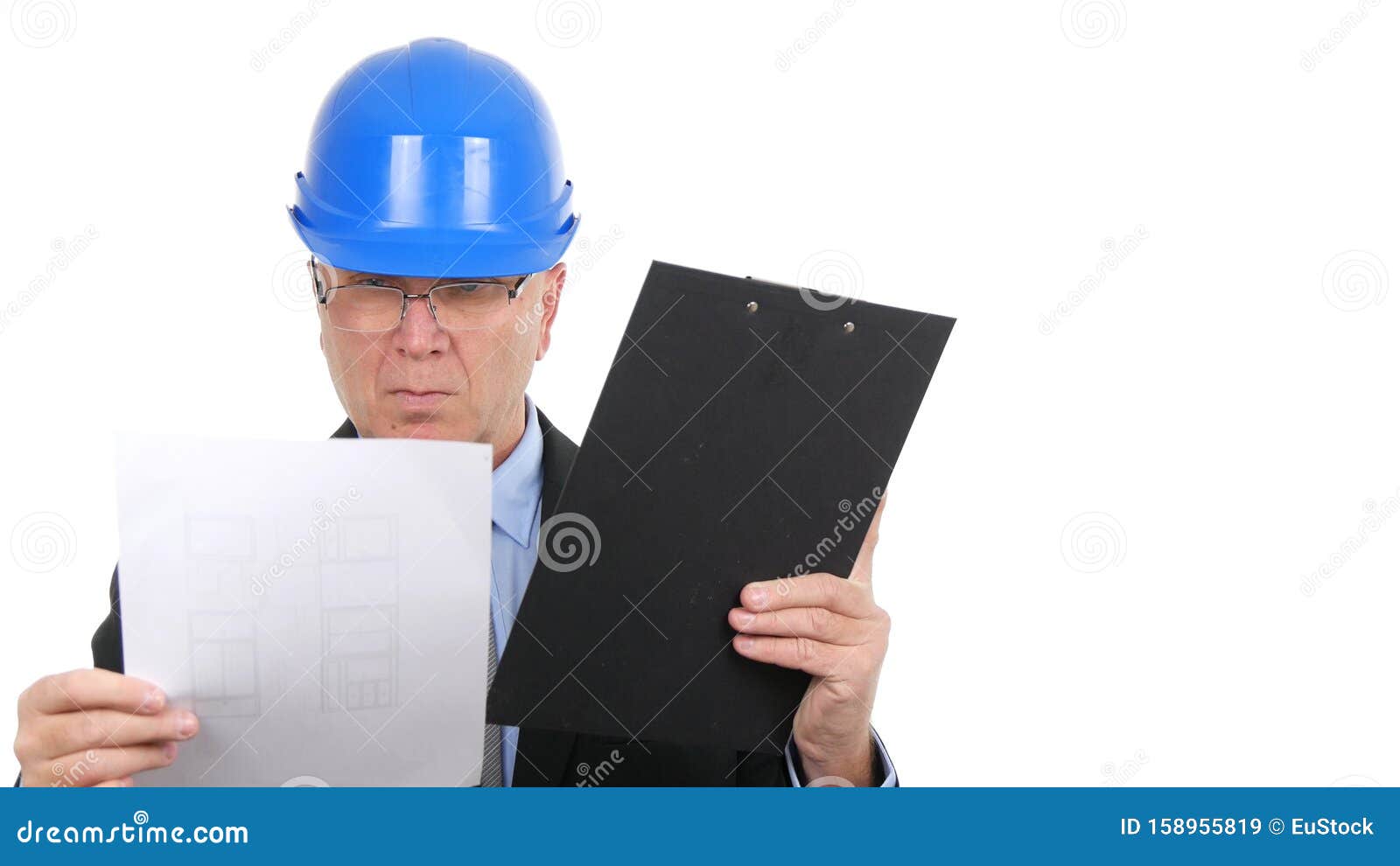 Image with a Serious Engineer Reading Technical Plans Stock Image ...