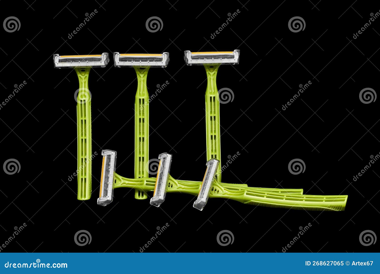 Several Disposable Razors in Green on a Black Background Stock Image ...