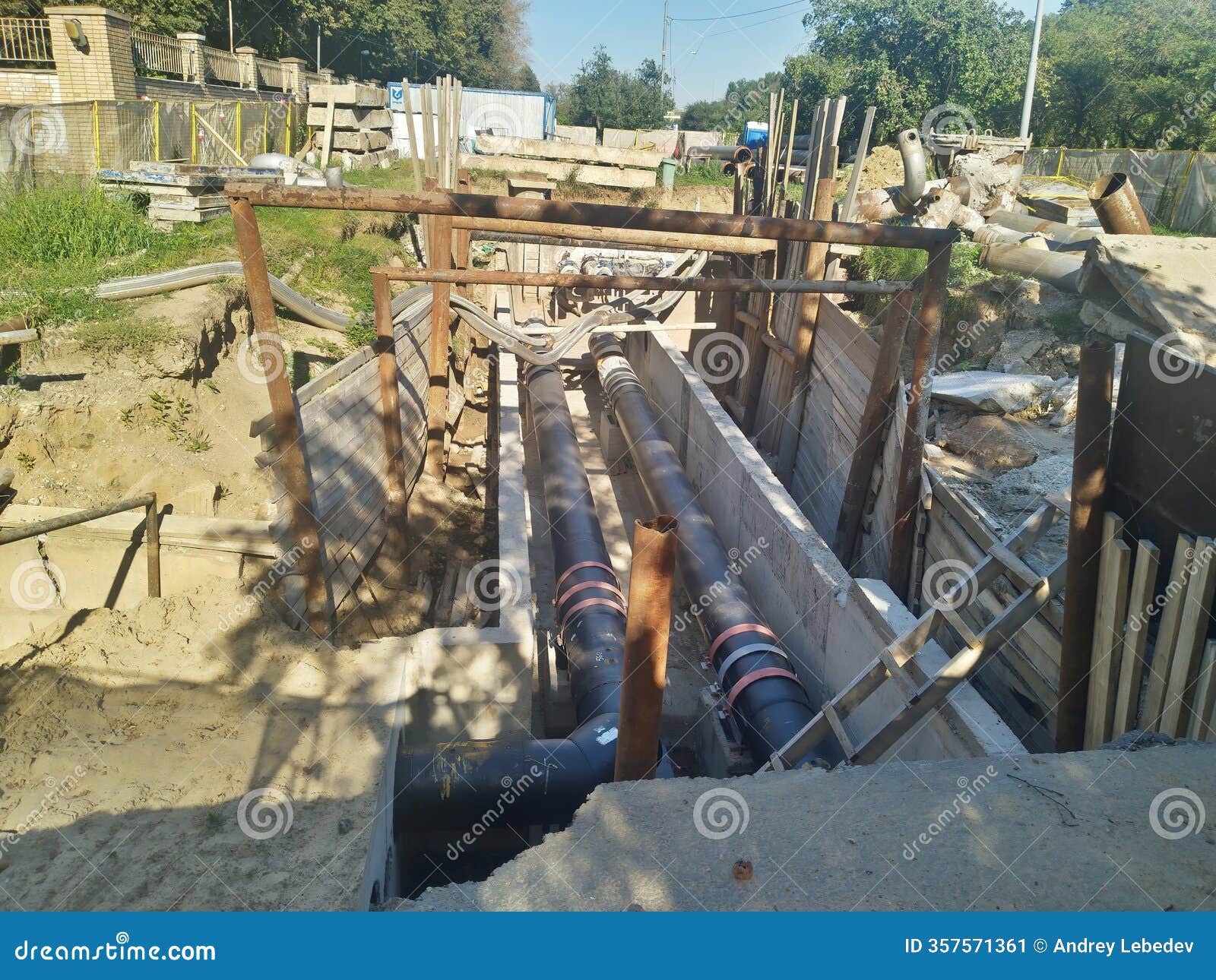 Underground Utility Installation: Active Construction Site with Large ...
