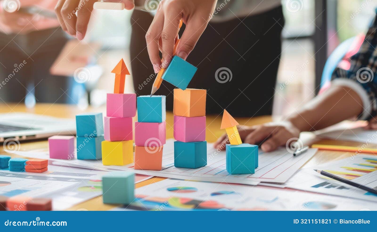 The Image Shows a Group of People Working Together To Build a Structure ...