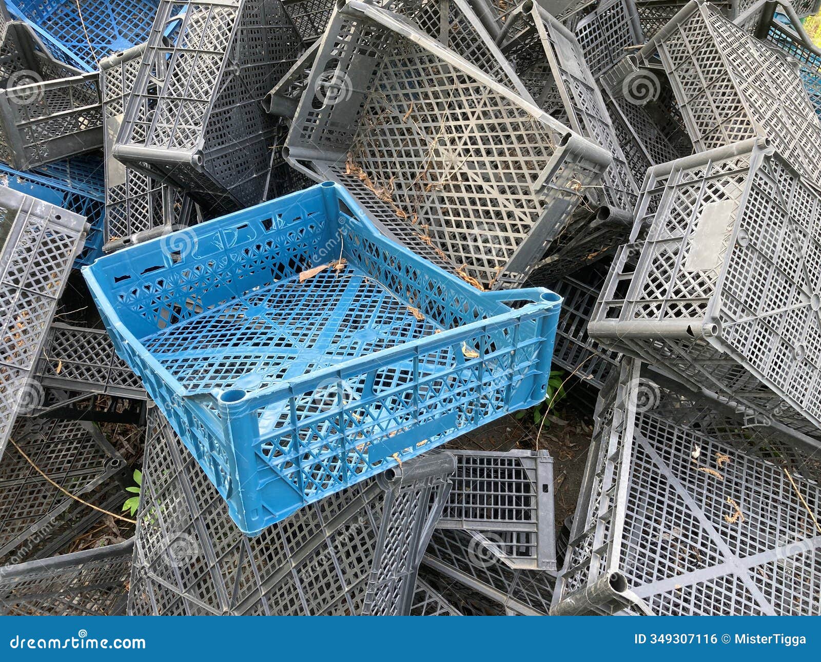 Image Shows a Stack of Plastic Crates in Various Sizes and Colors Blue ...