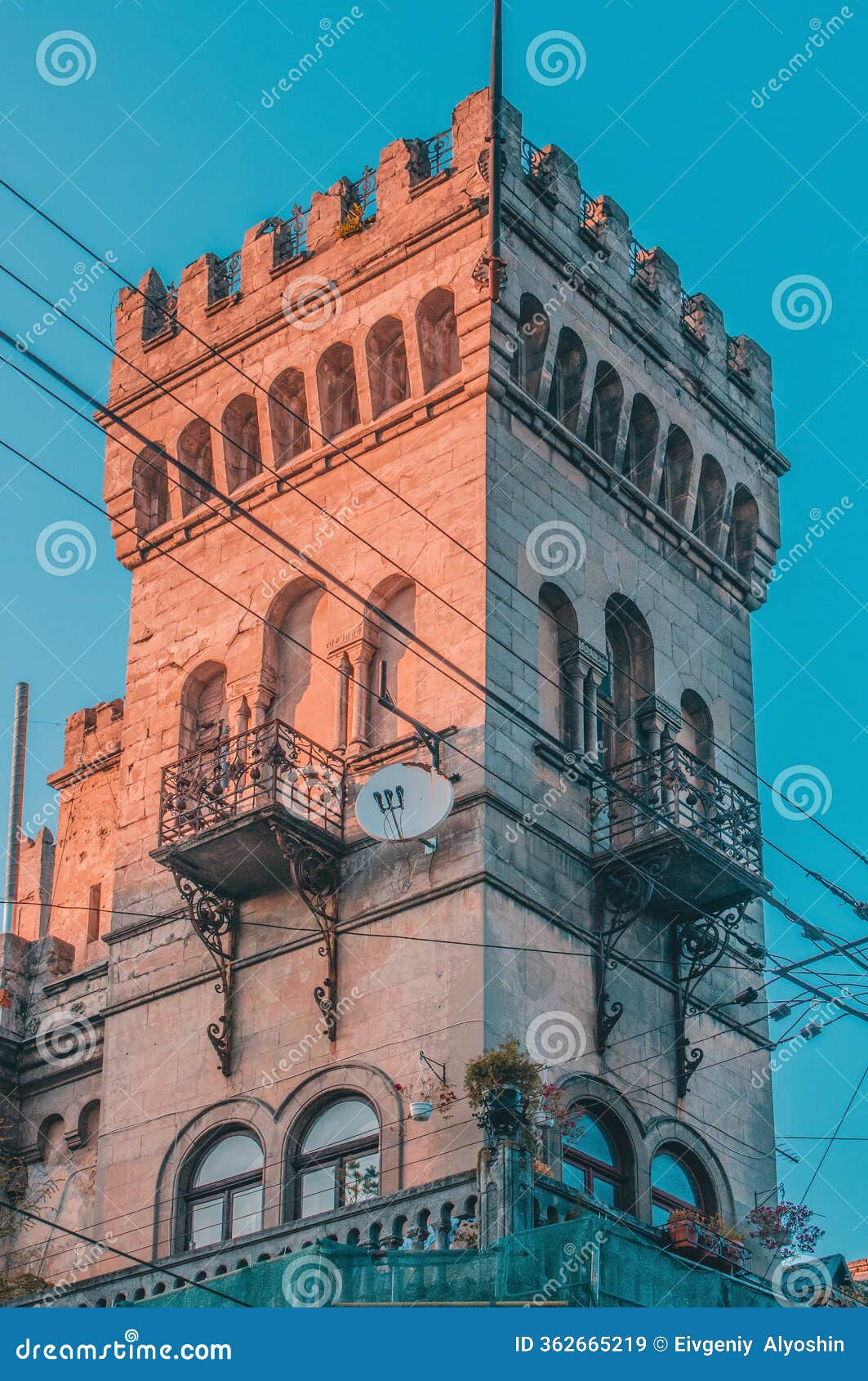 Tall Building with Architectural Features Resembling a Medieval Tower ...