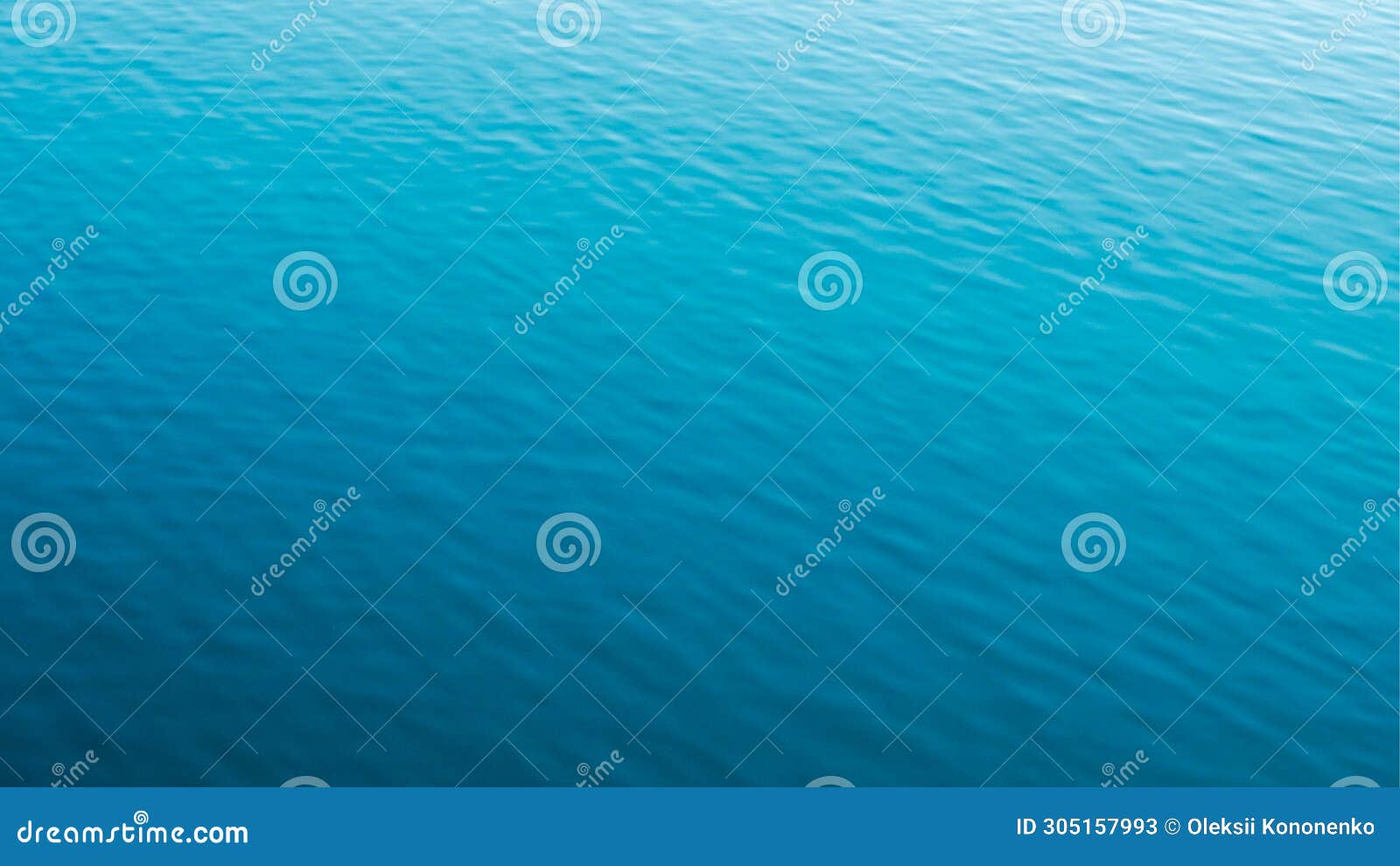 The Image Shows a Tranquil Water Surface with Gentle Ripples Stock ...