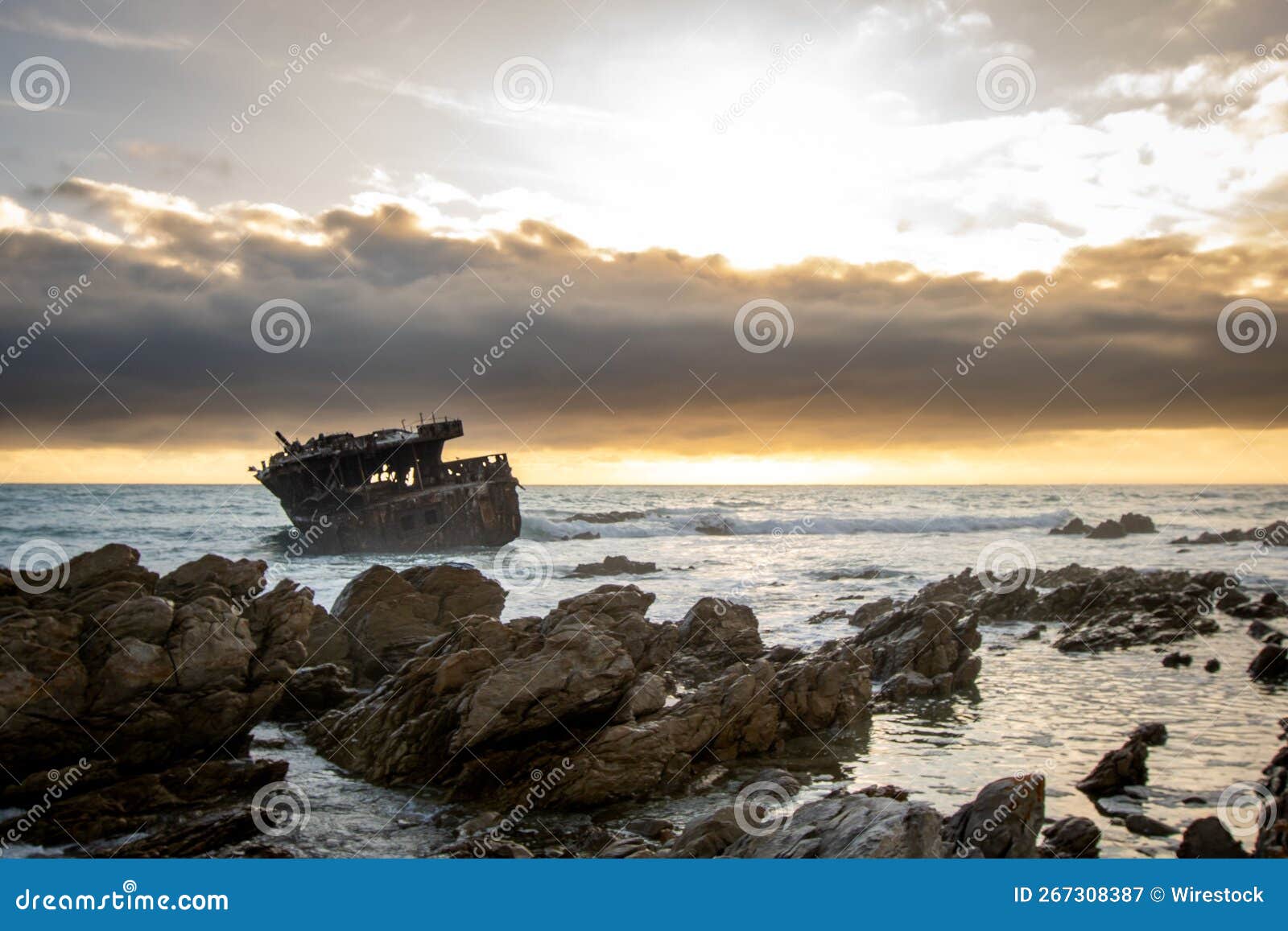 Image of a Sing Ship in the Waves of the Sea during the Yellow Sunset ...