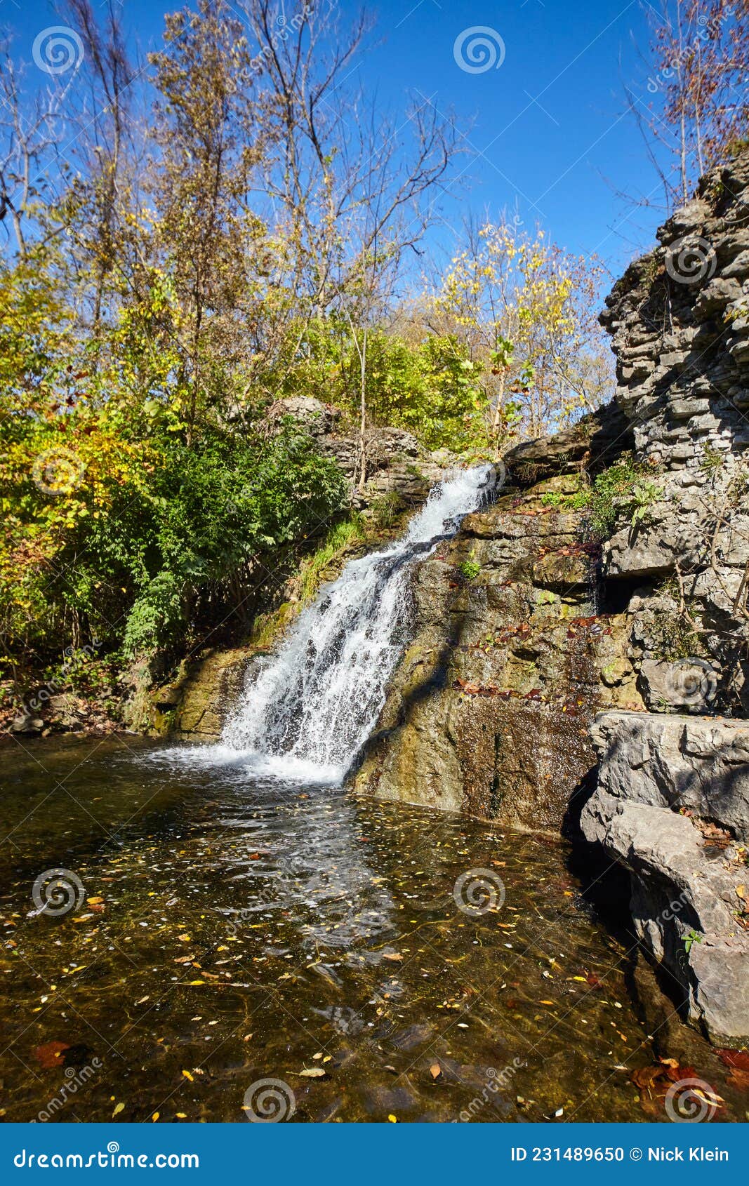 Small Waterfall Over Rocks into Pond Fall Stock Photo - Image of river ...